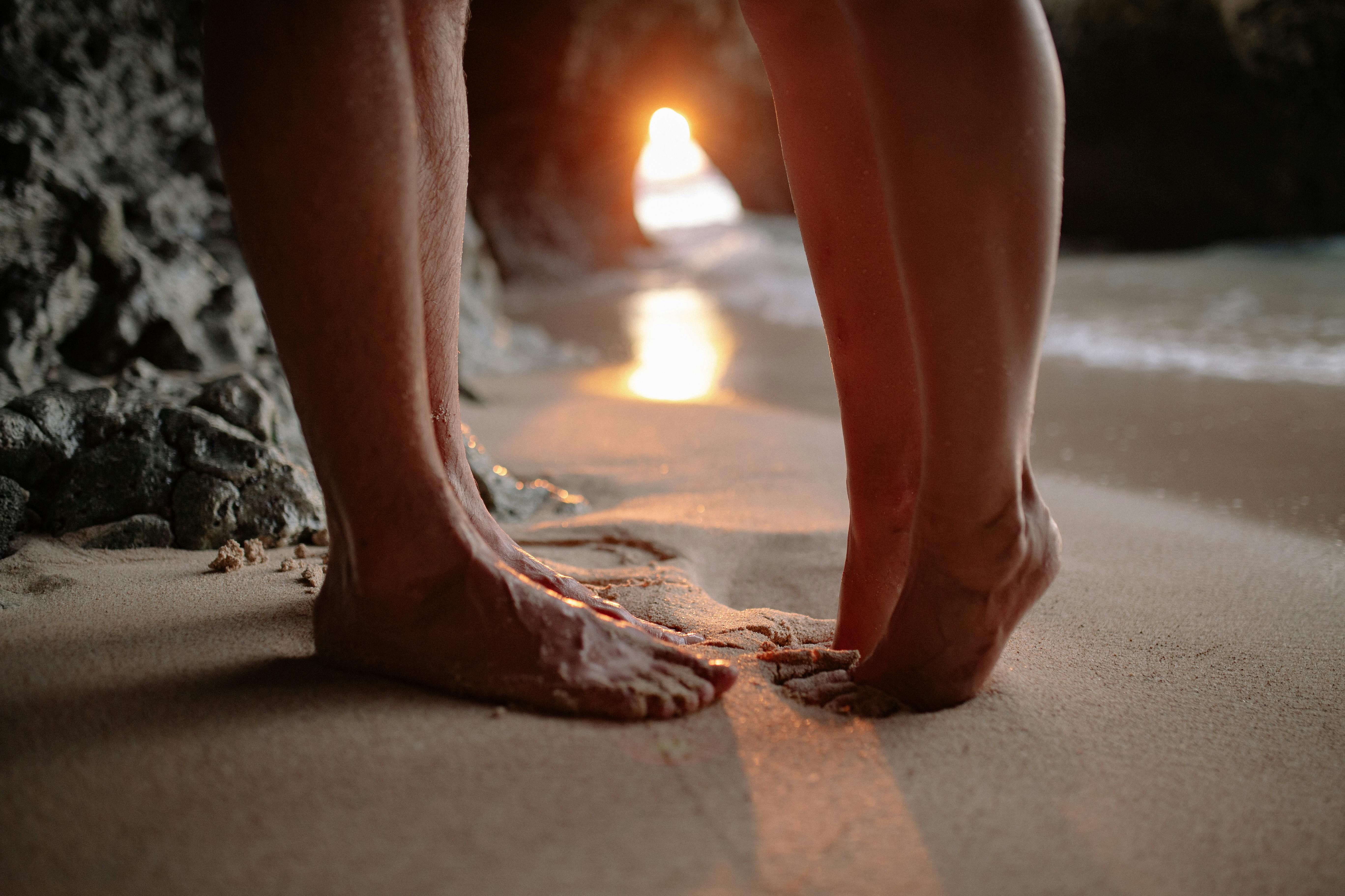 Close-Up of People Barefooted on the Sand · Free Stock Photo