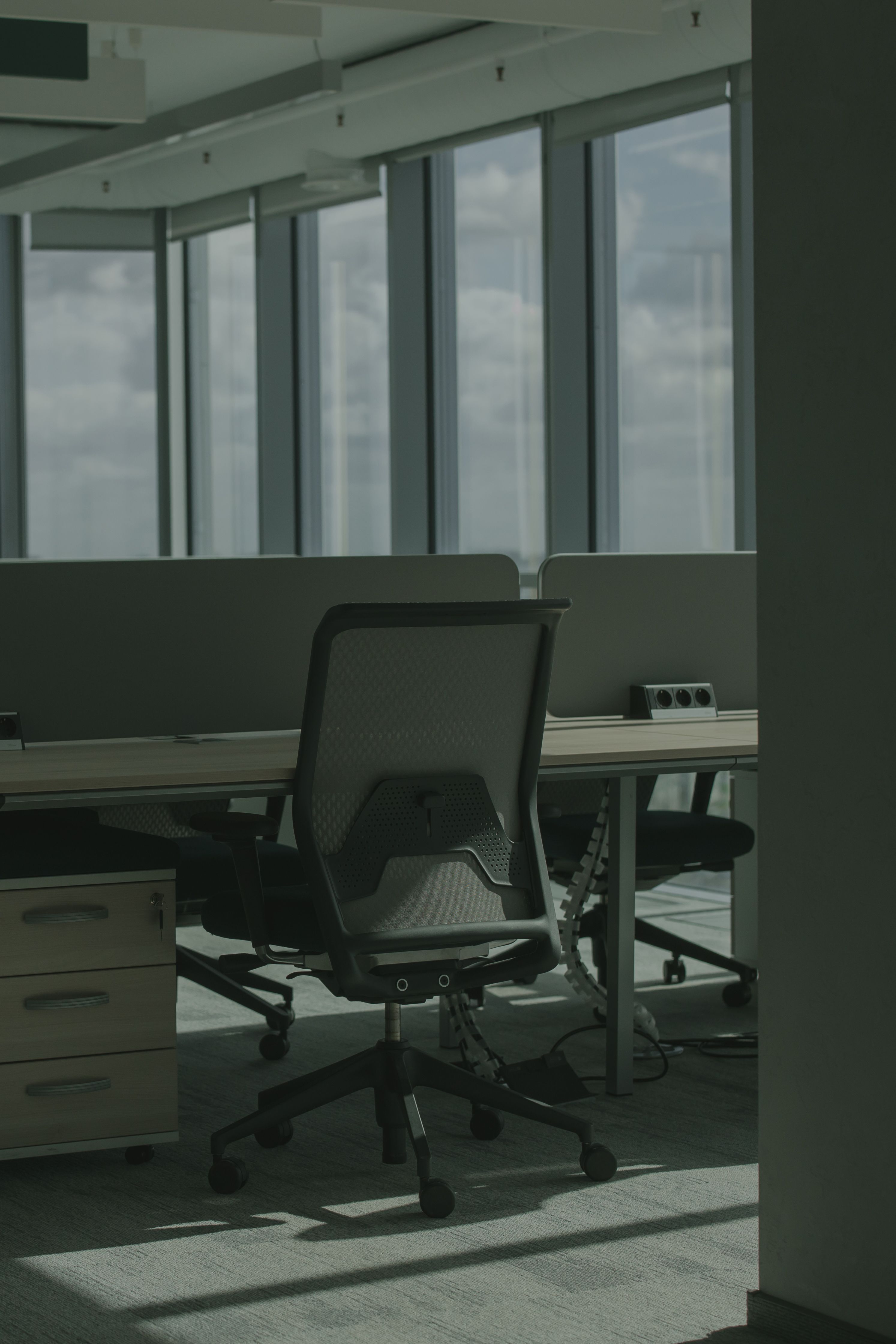 Empty Messy Desk Inside an Office · Free Stock Photo