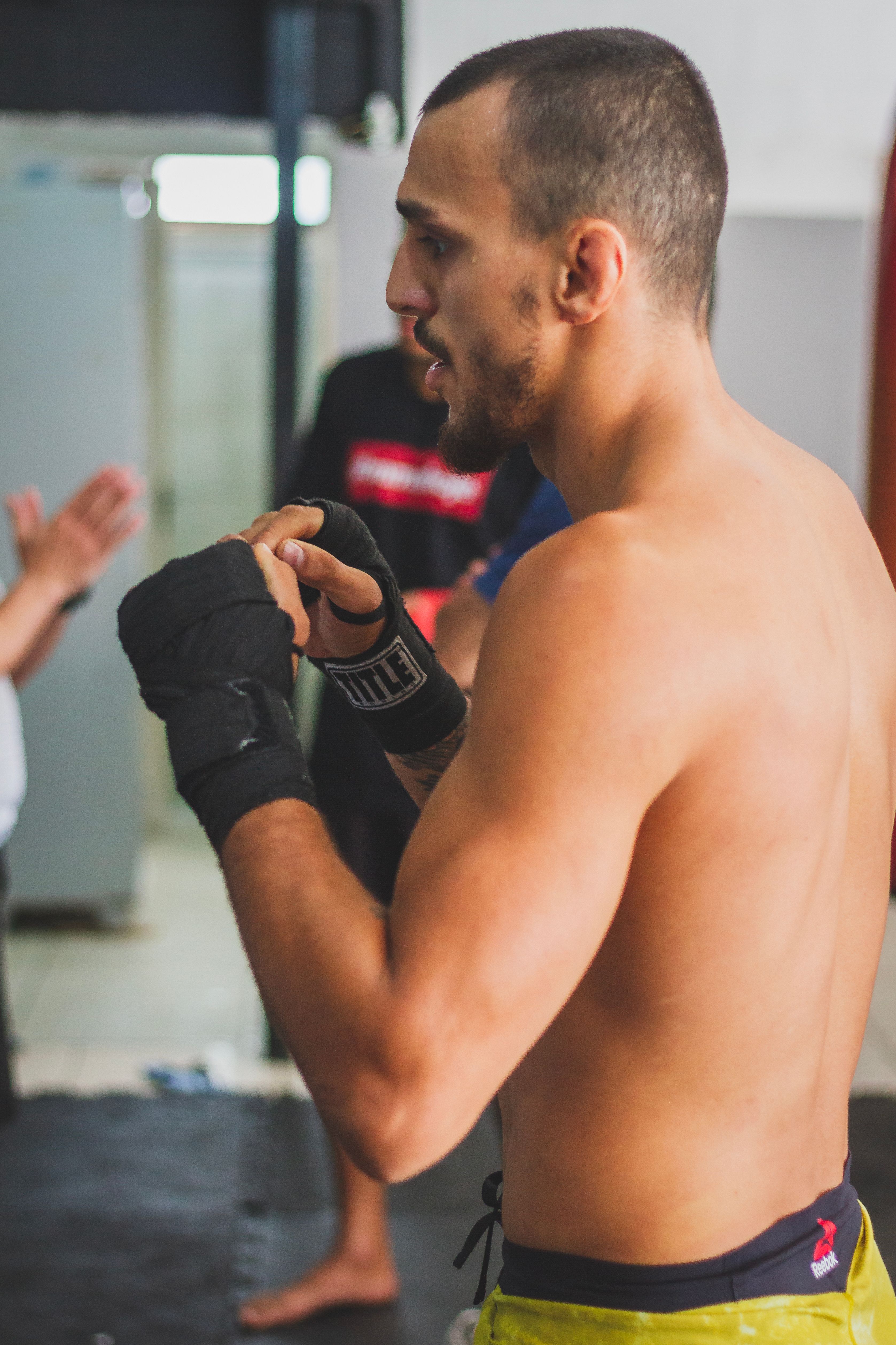 Shirtless Men Fighting with Sword · Free Stock Photo