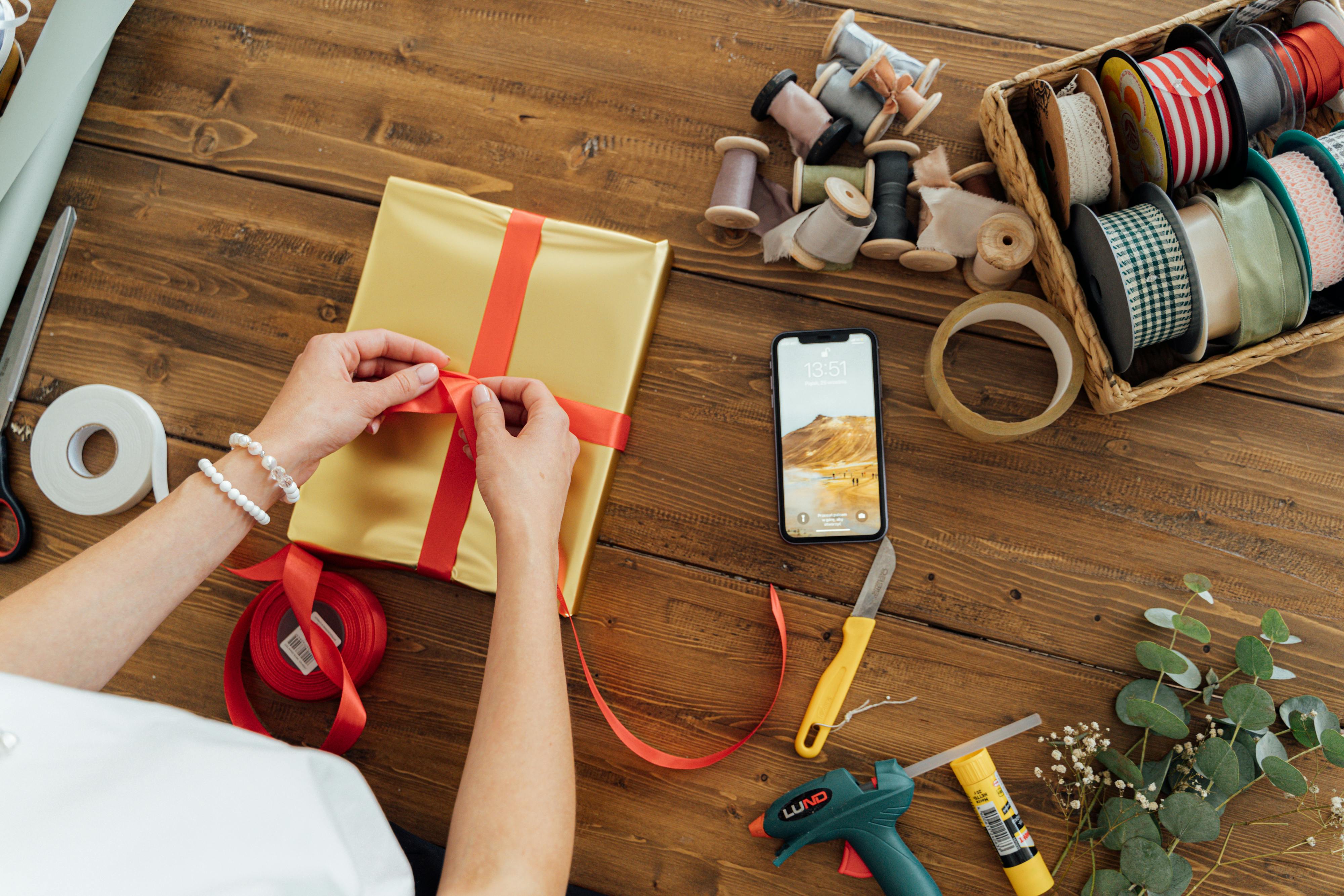 Person Holding Orange and White Plastic Toy · Free Stock Photo
