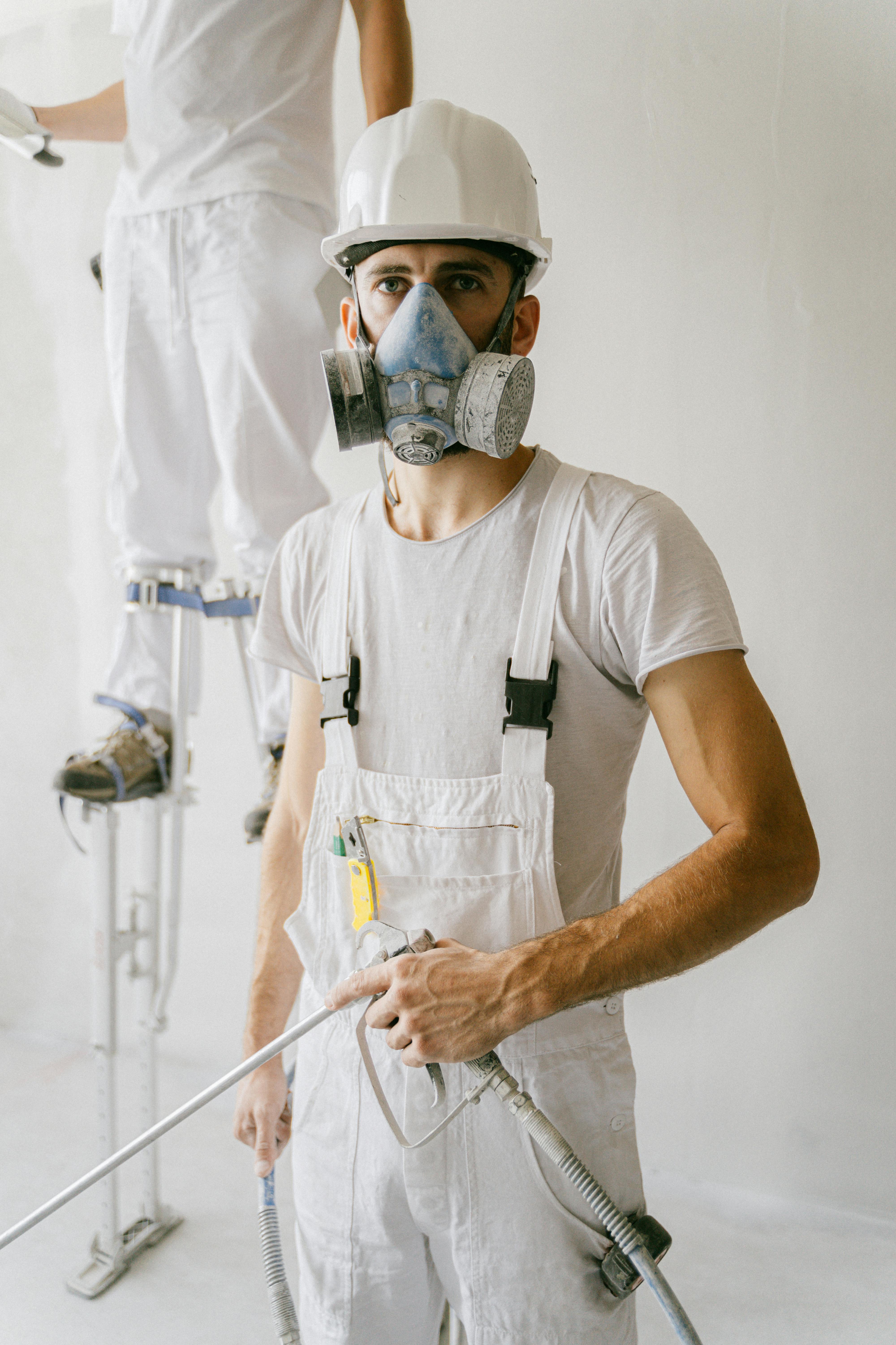 A Man Wearing Construction Safety Gear · Free Stock Photo