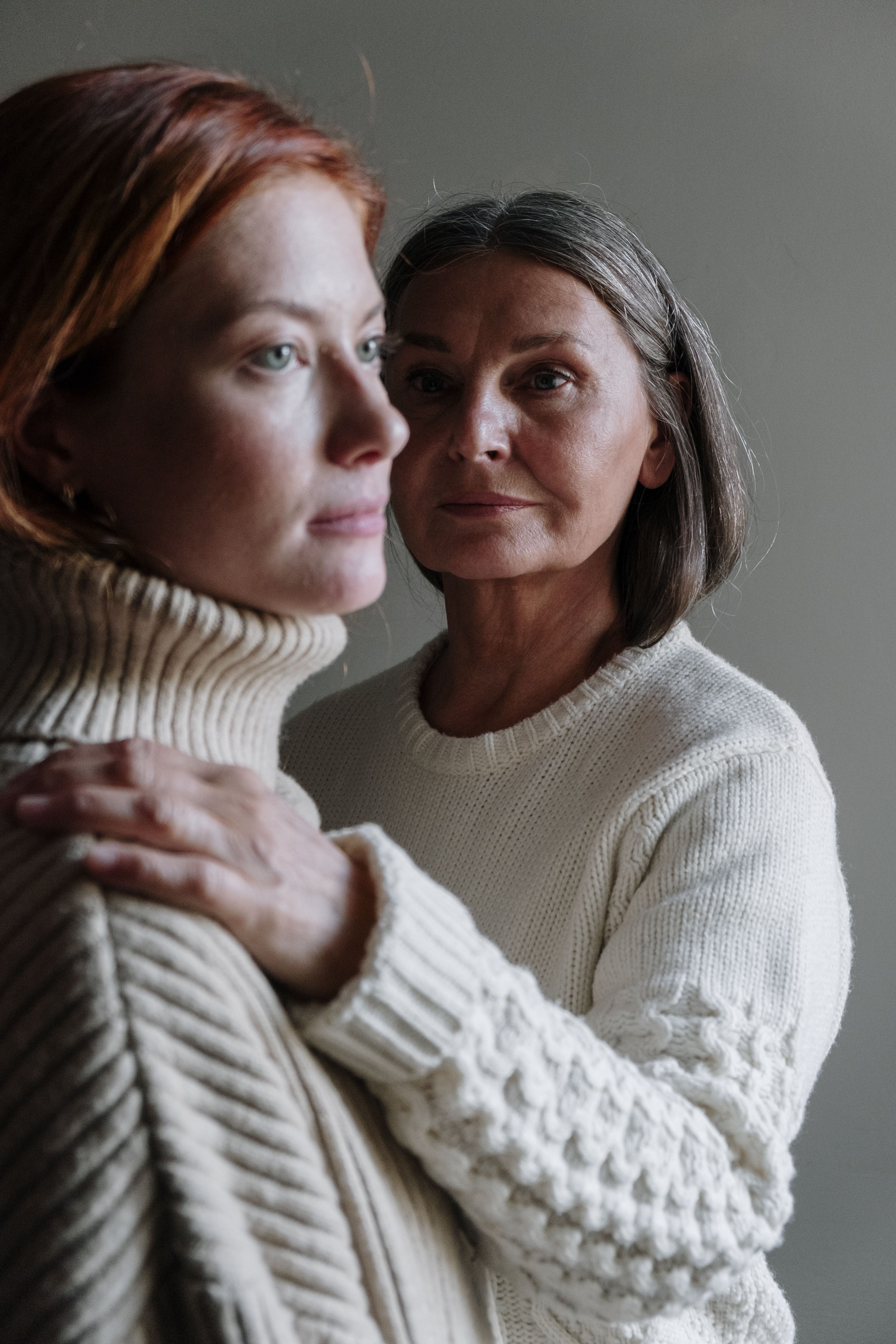 Two Women in Knitted Sweaters · Free Stock Photo
