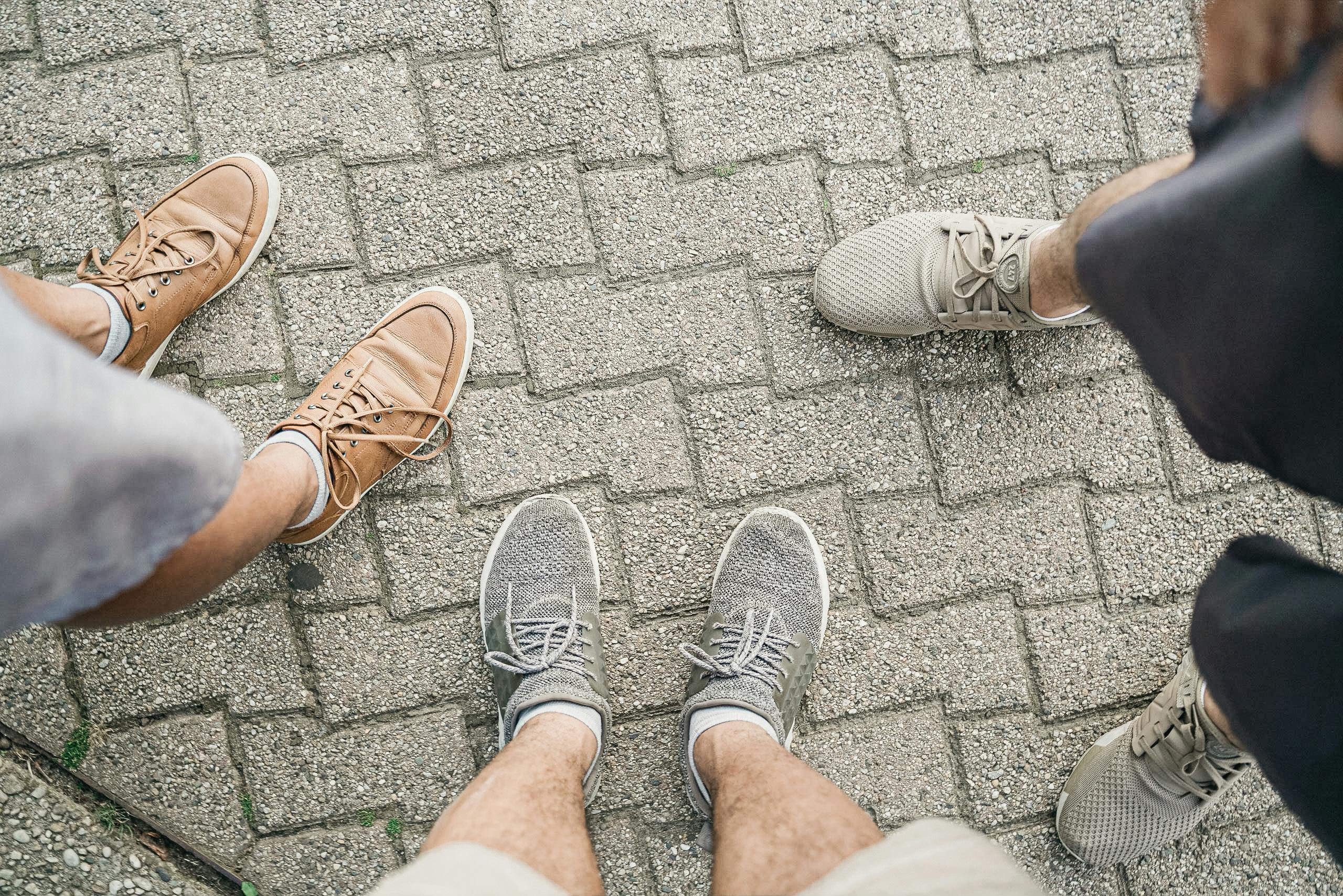 Shoes of People Standing · Free Stock Photo