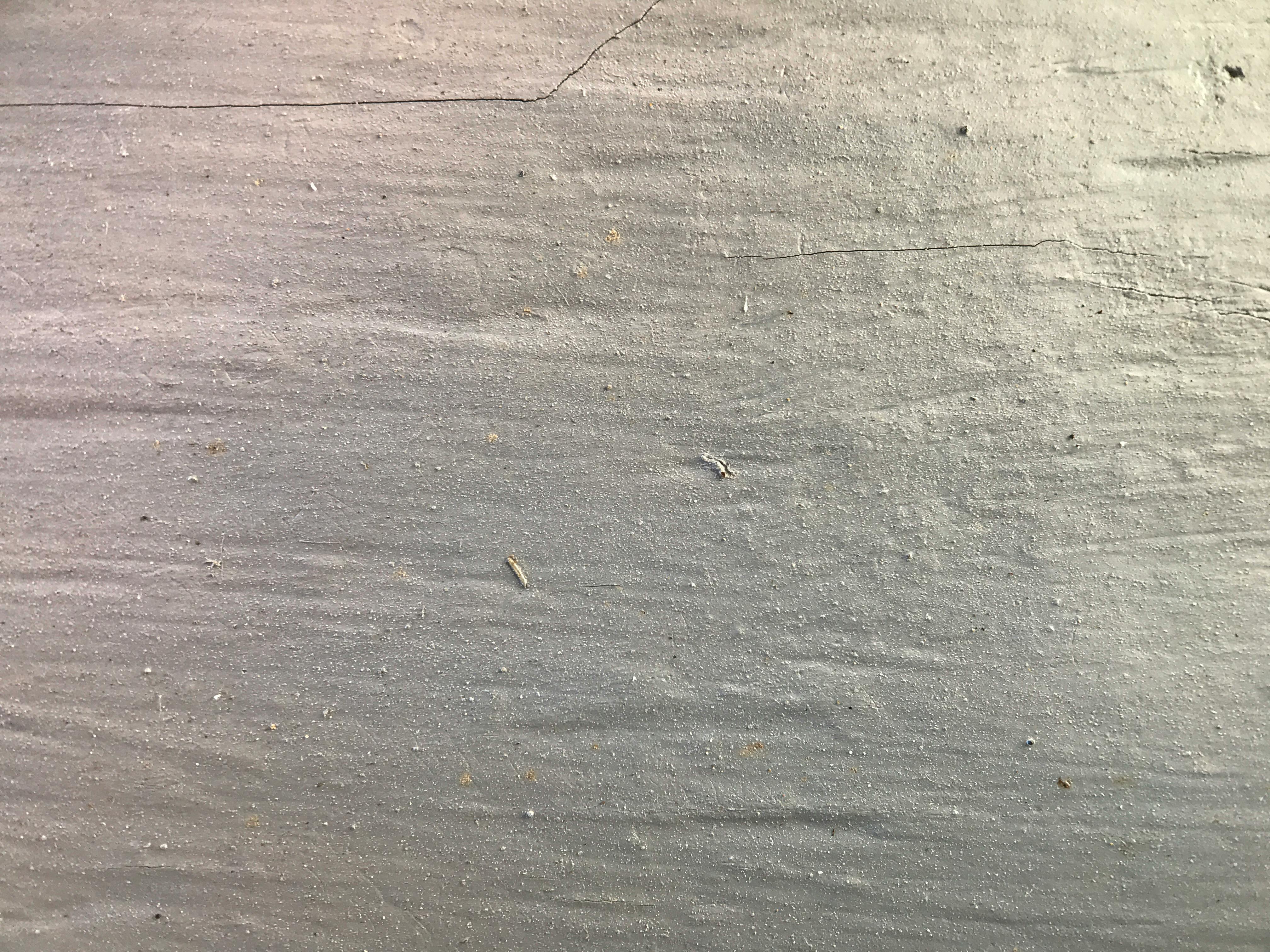 Black Round Plate on Concrete Floor · Free Stock Photo