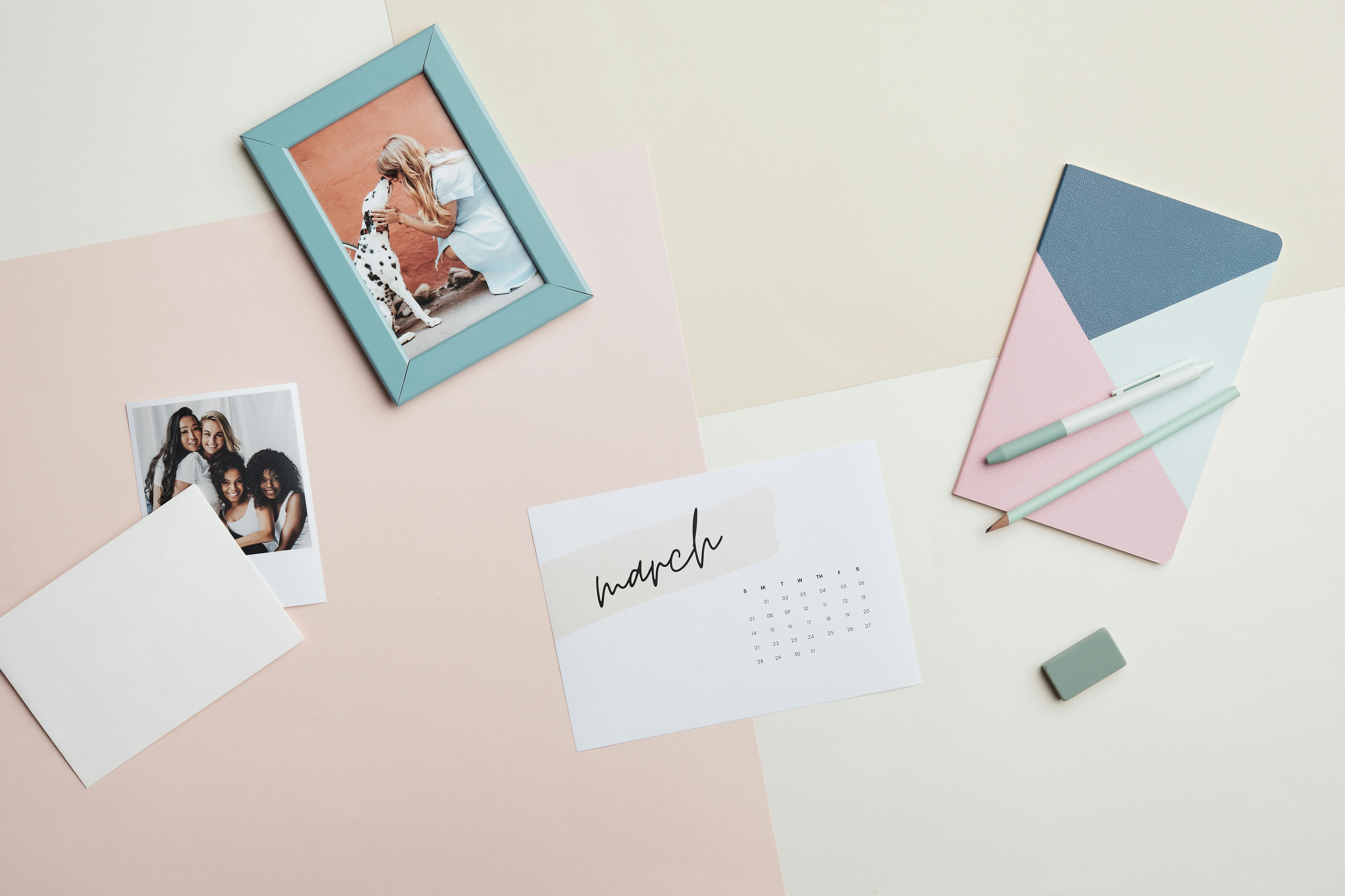 Pastel Coloured Still Life with Stationery and Photographs · Free Stock ...