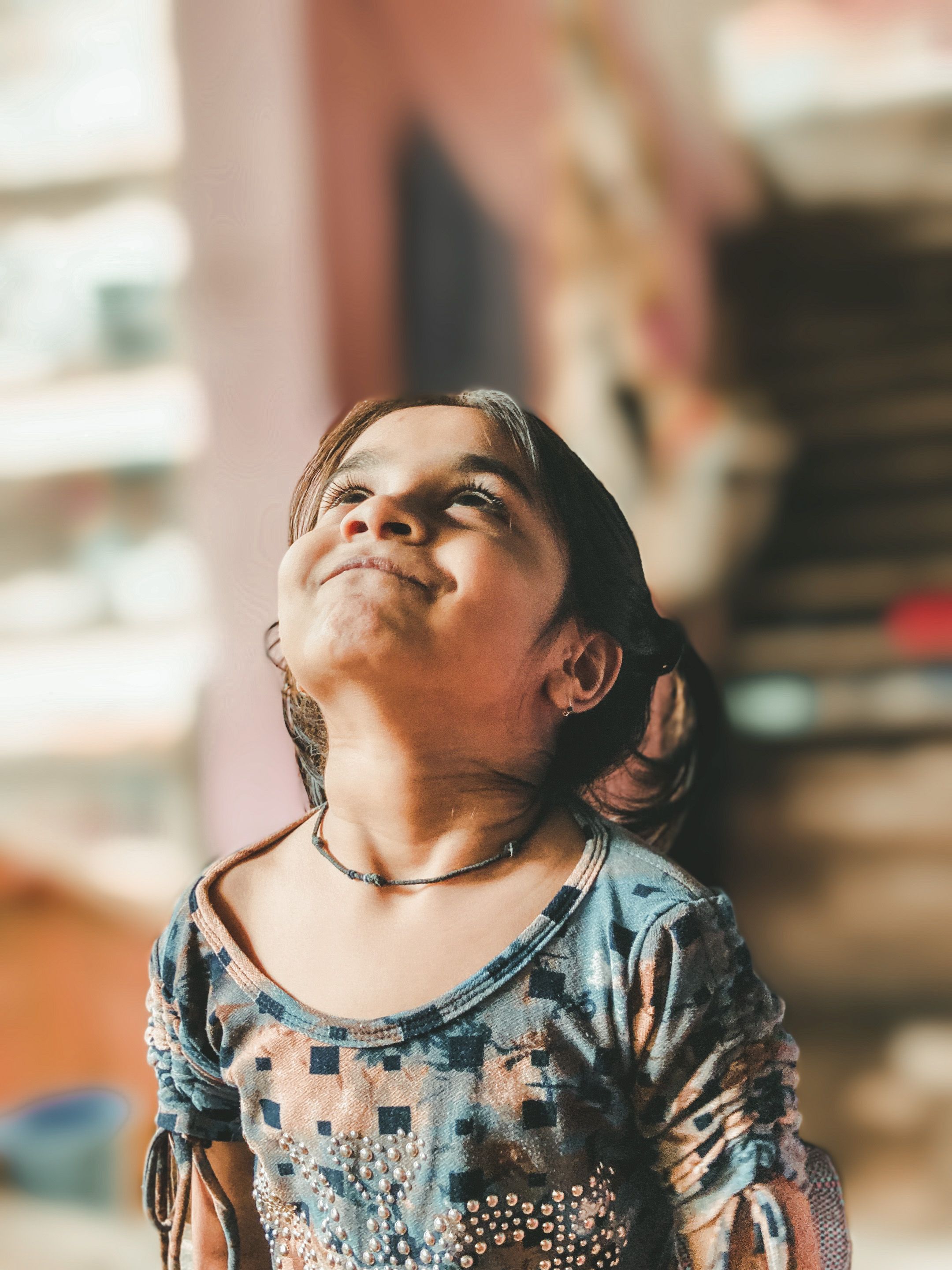 A Girl Looking Upward · Free Stock Photo