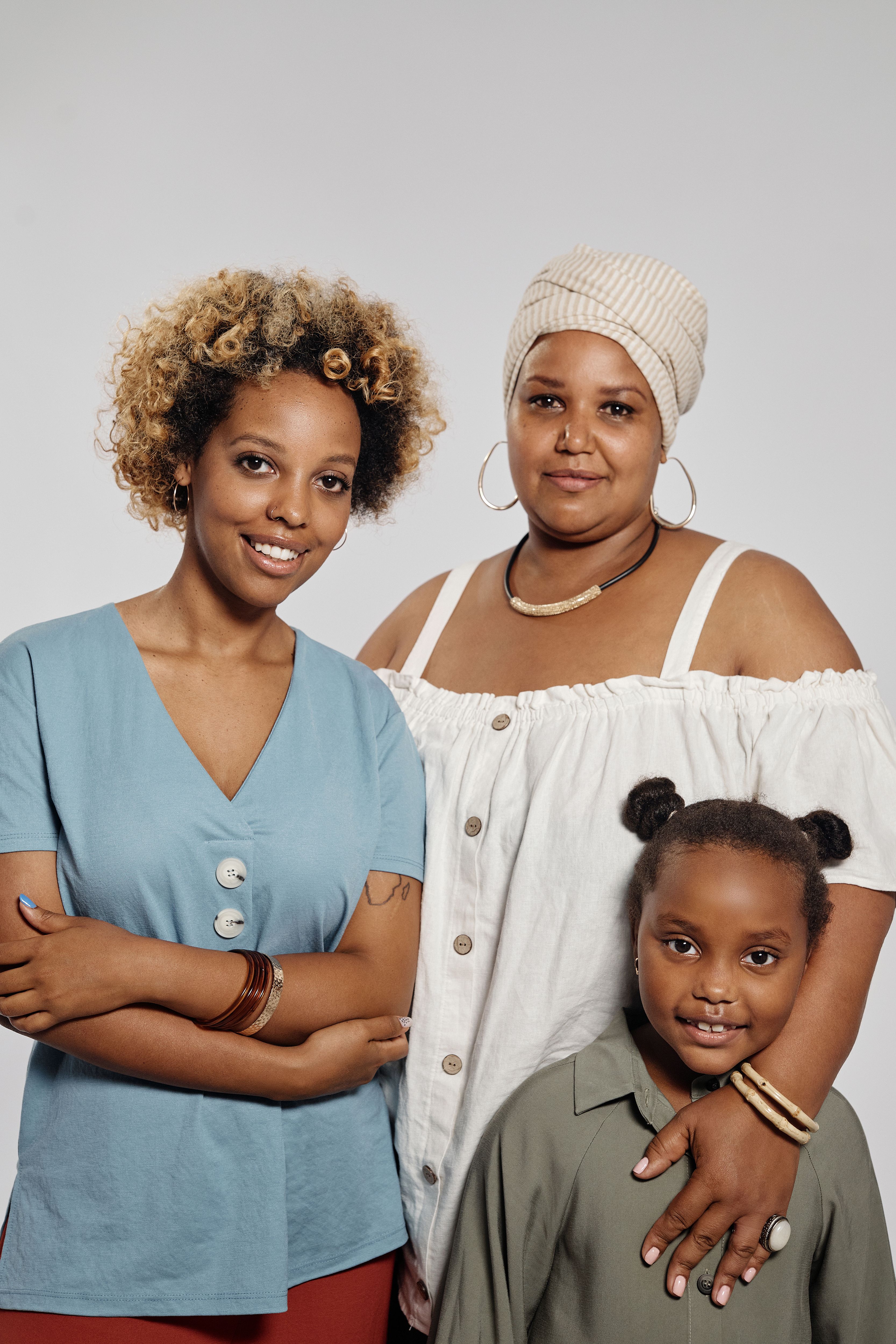 Beautiful Family Standing Together · Free Stock Photo