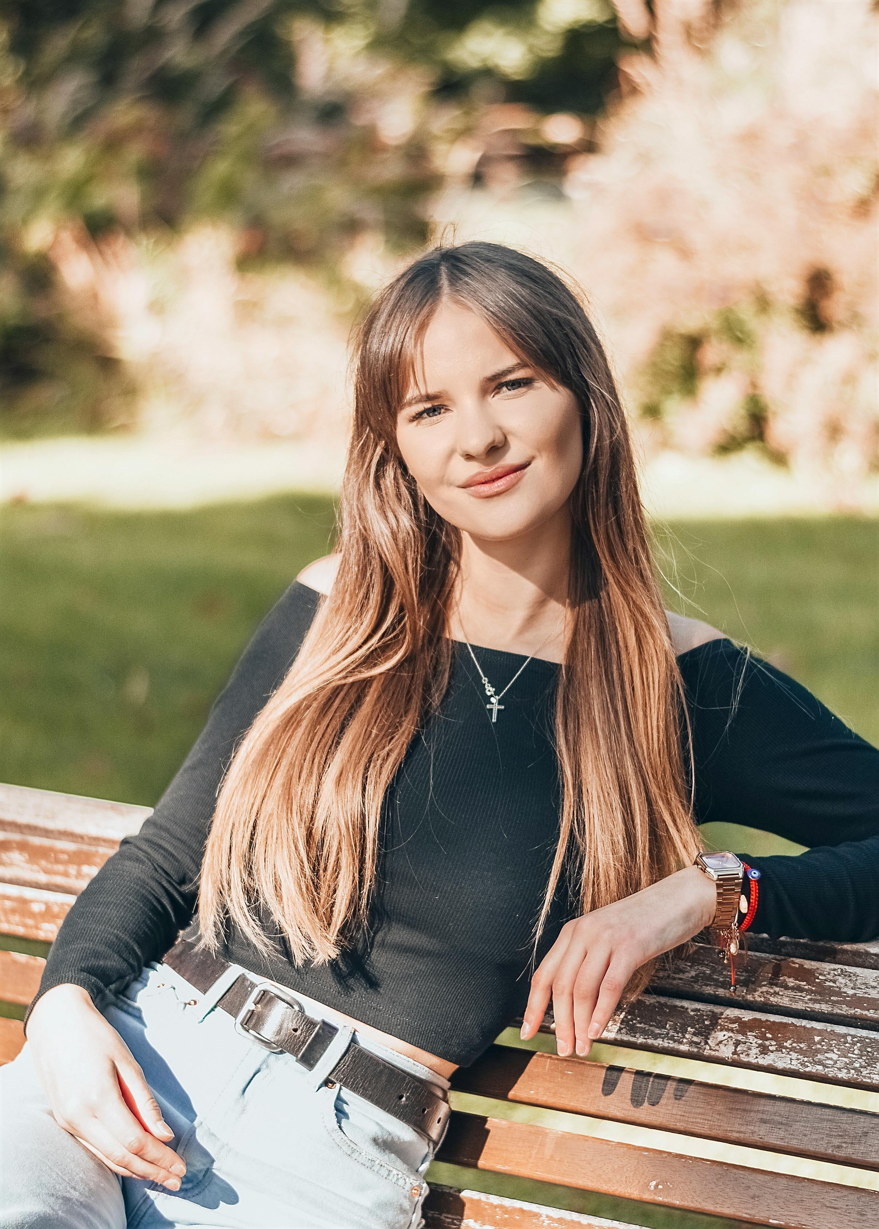A Beautiful Woman Wearing an Off-shoulder Blue Dress · Free Stock Photo