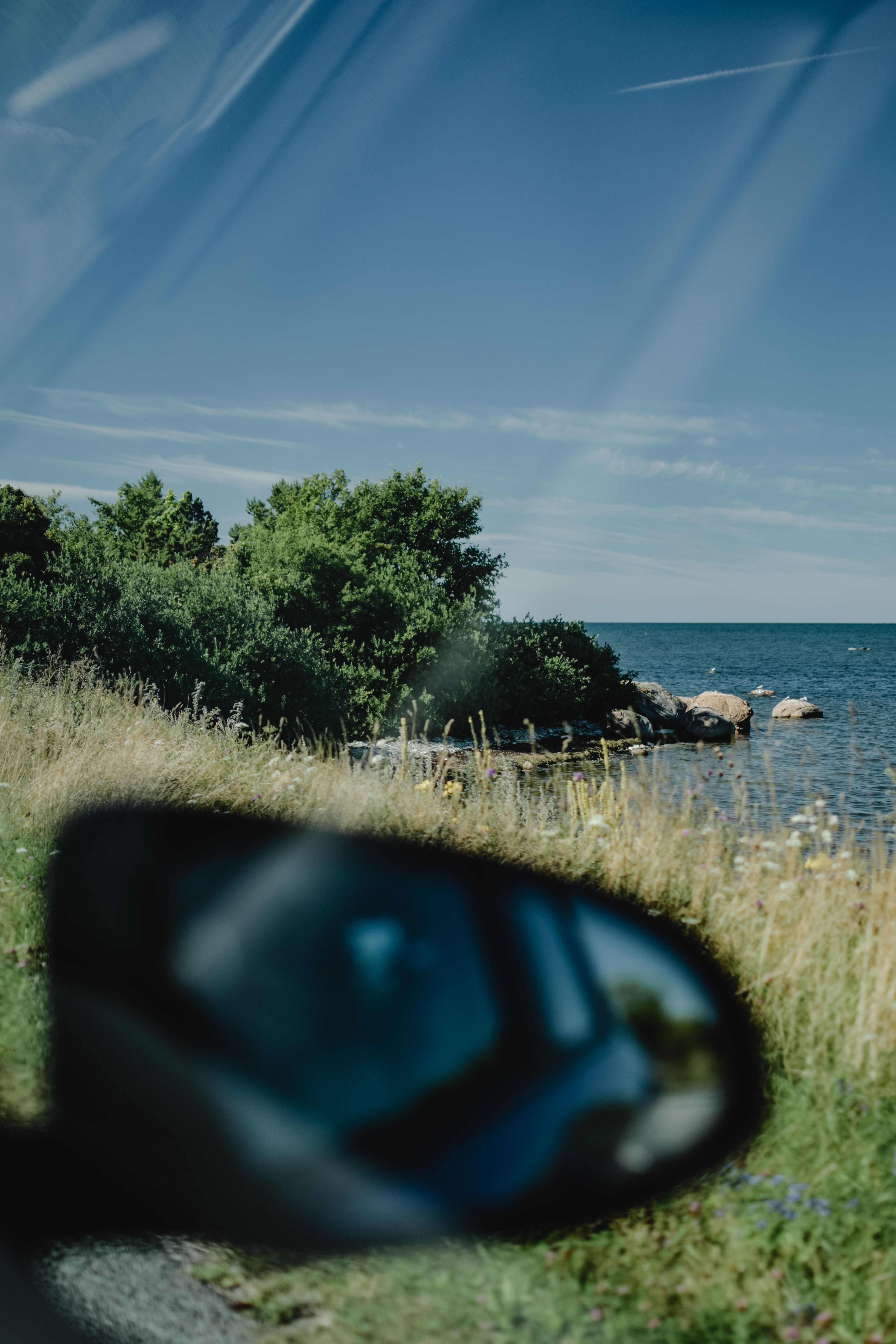 Seashore Seen Through Car Window · Free Stock Photo