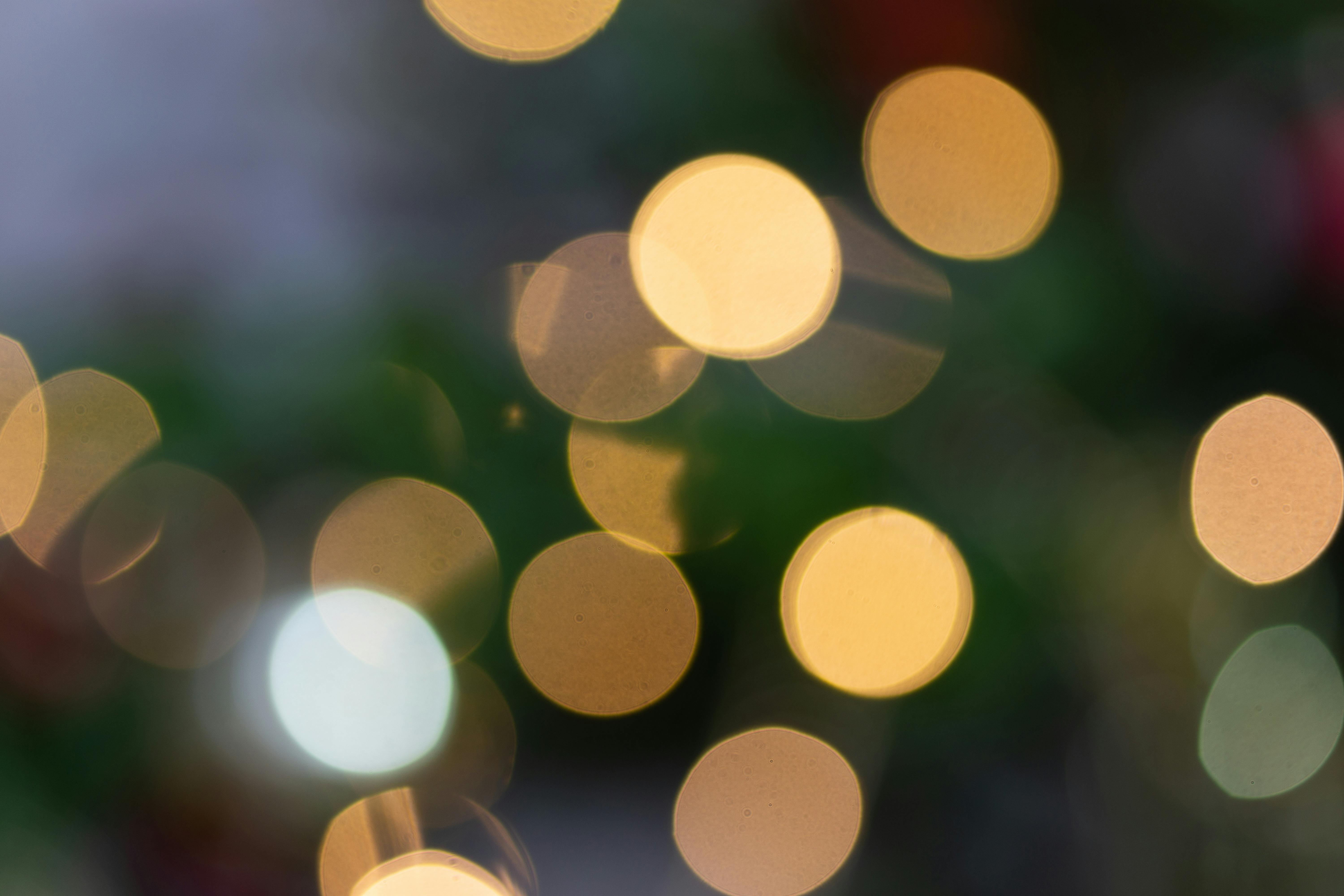 Light Circles on Sky over Rocks at Night · Free Stock Photo