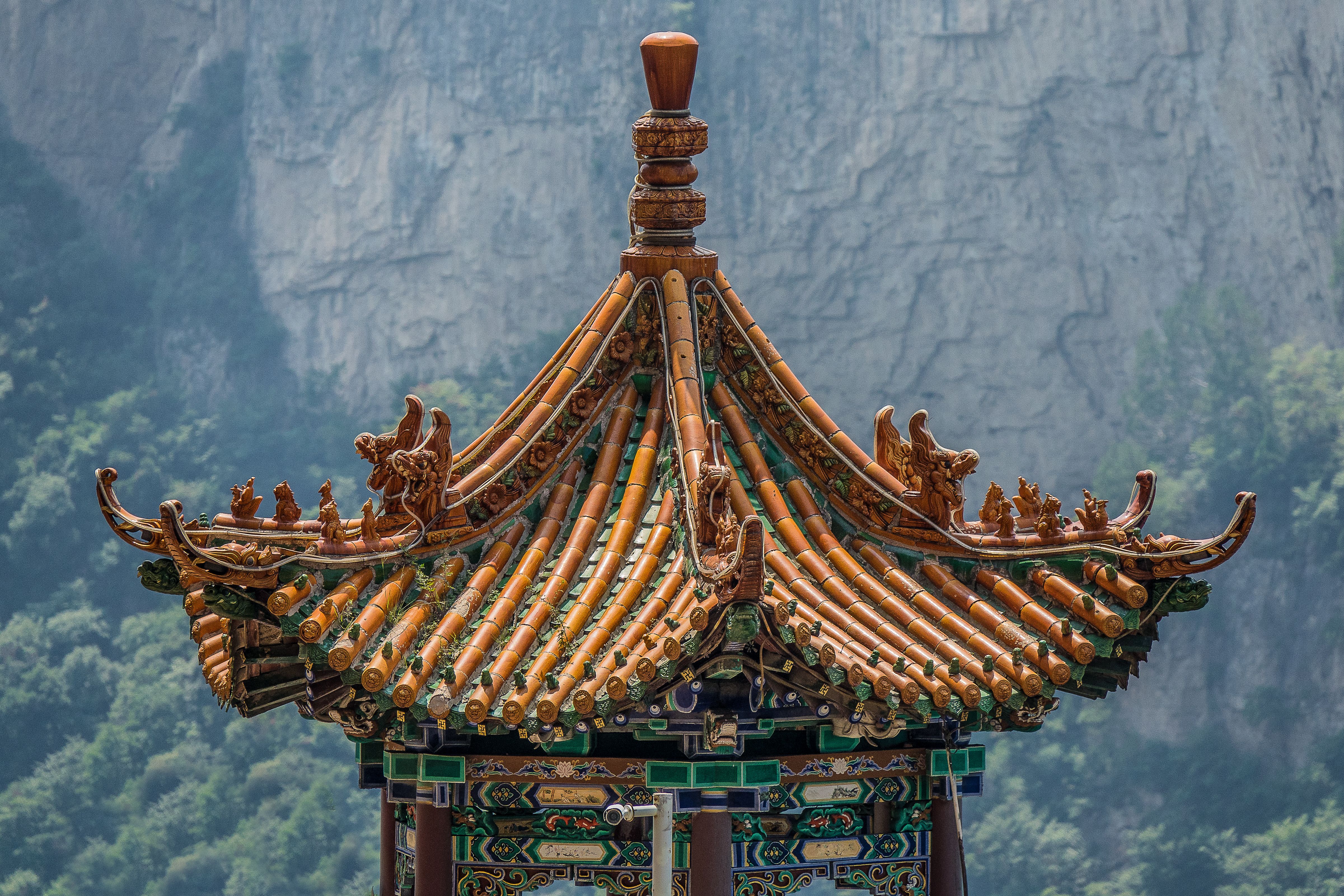 Close up of Pagoda Roof and Mountain in Background · Free Stock Photo