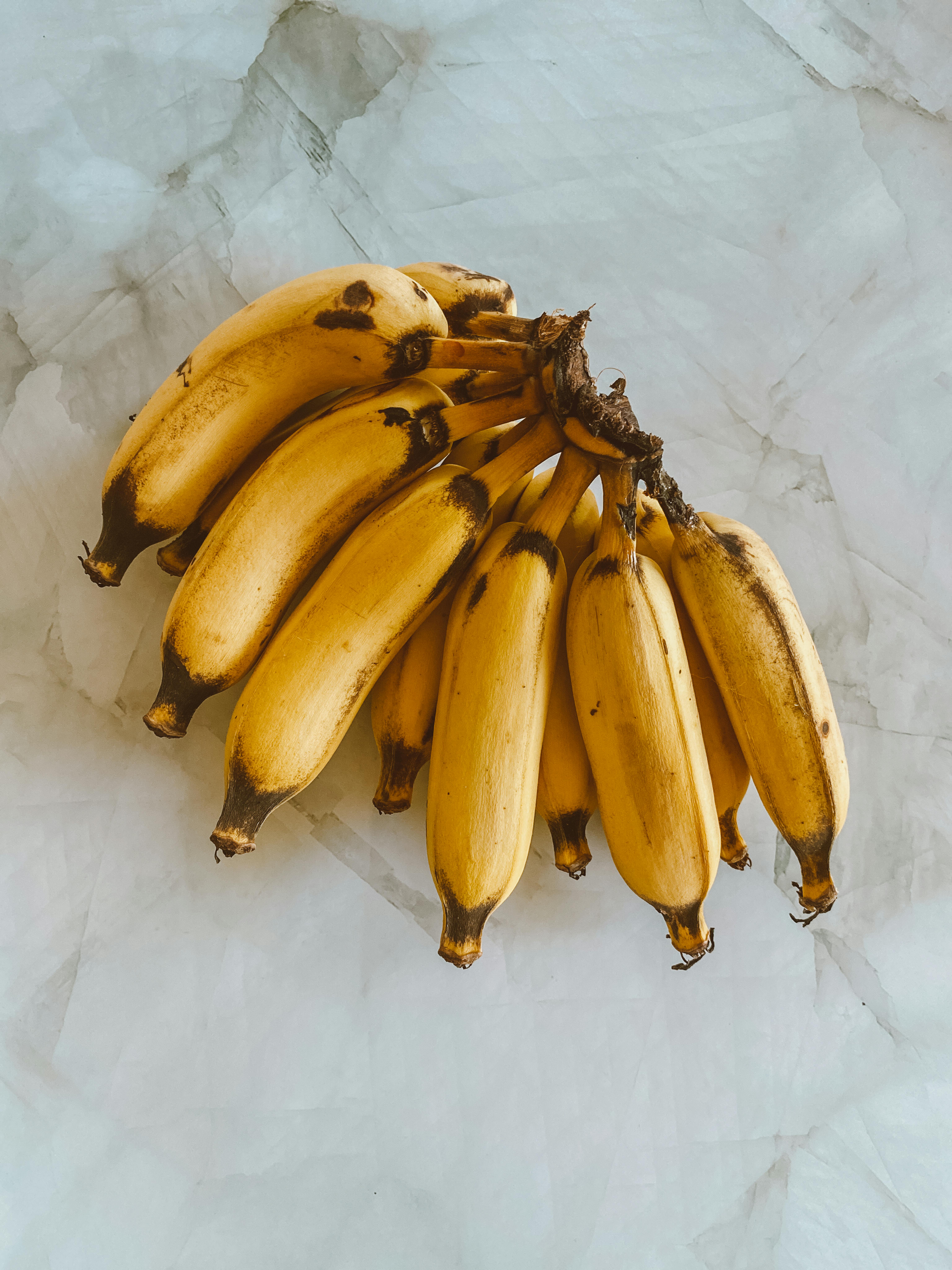 A Hand of Bananas · Free Stock Photo