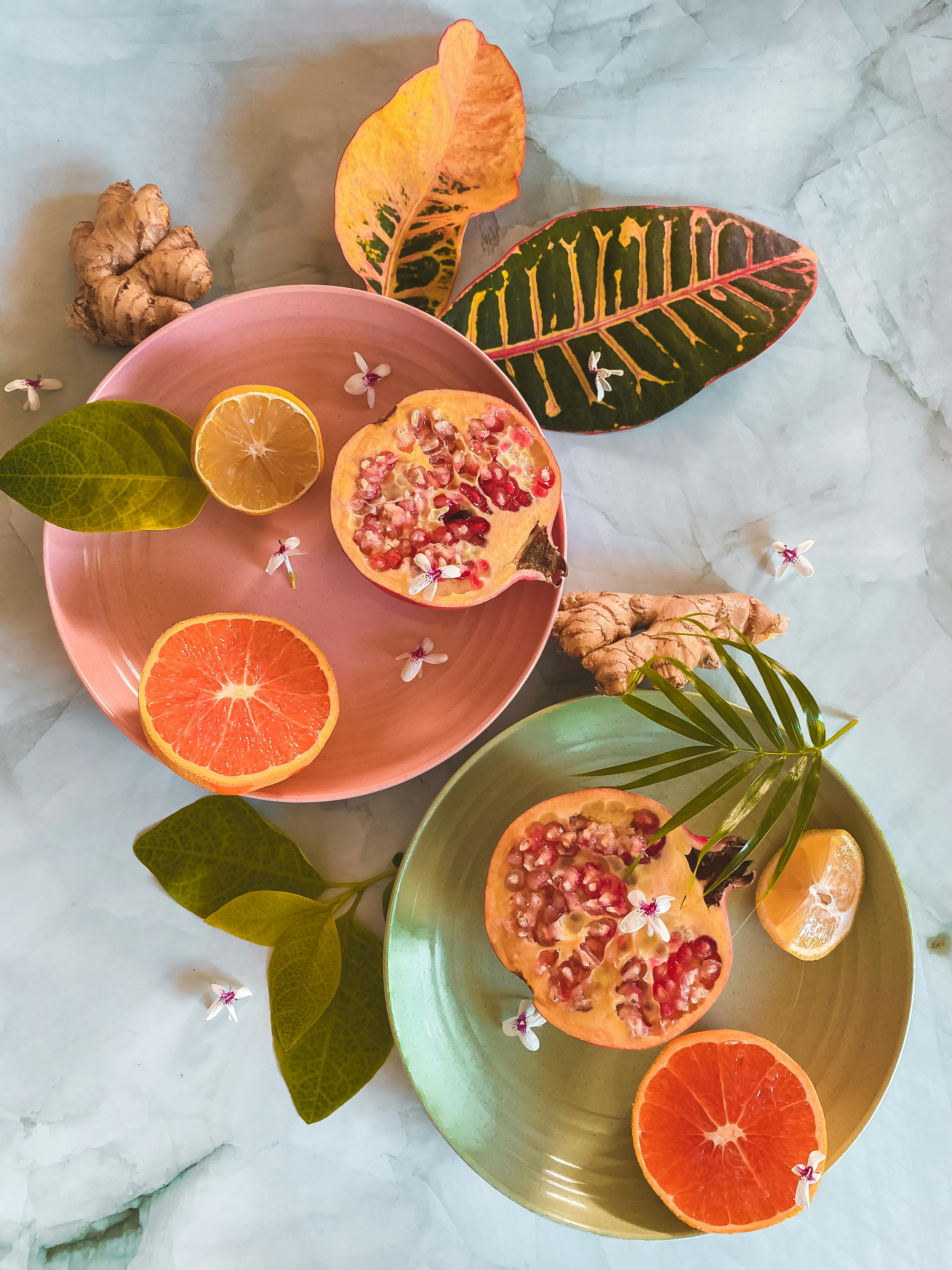 Ripe fresh fruits on beige surface · Free Stock Photo