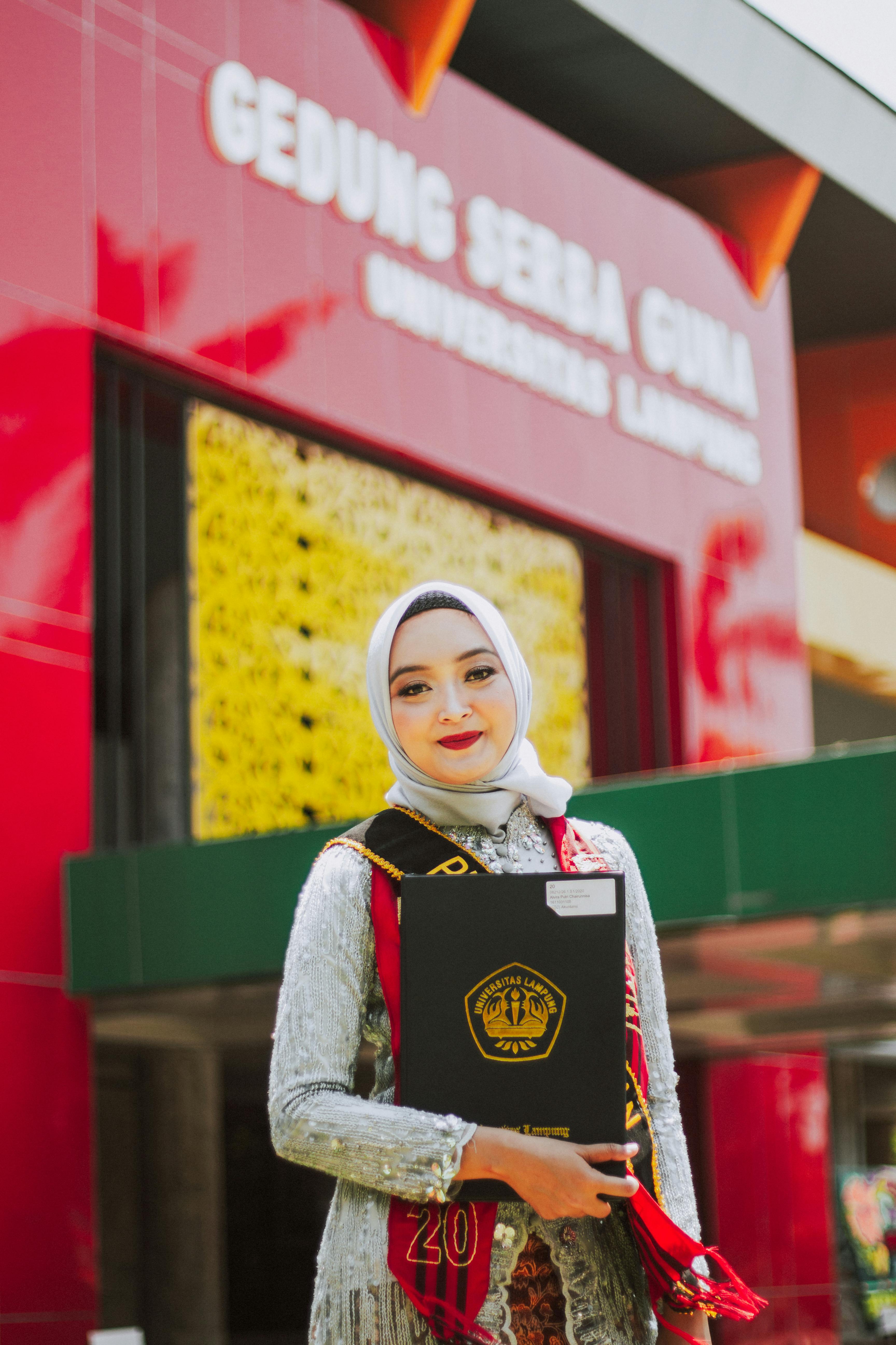 A Woman Wearing Hijab Graduating · Free Stock Photo