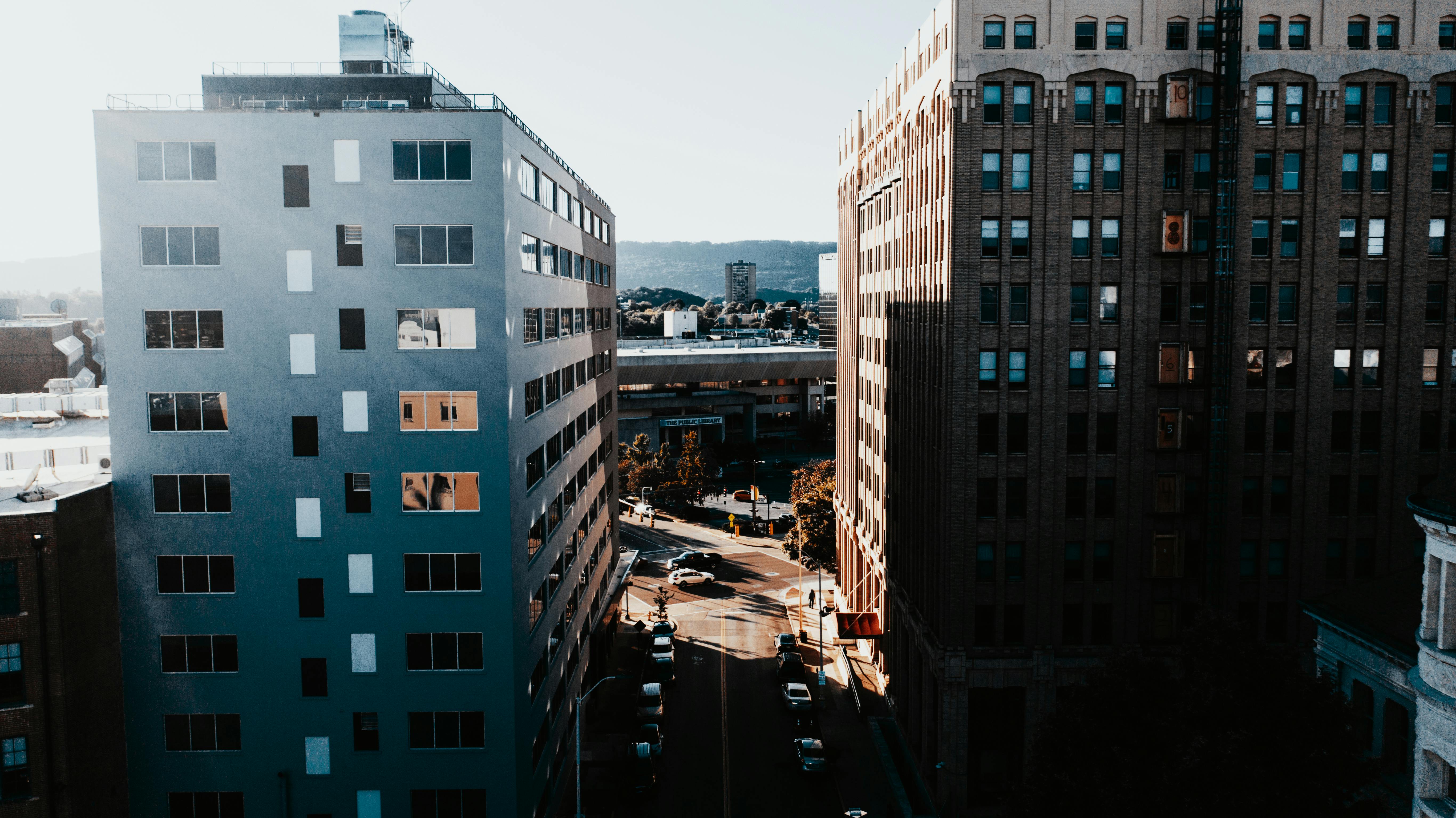 Residential buildings in city district on sunny day · Free Stock Photo