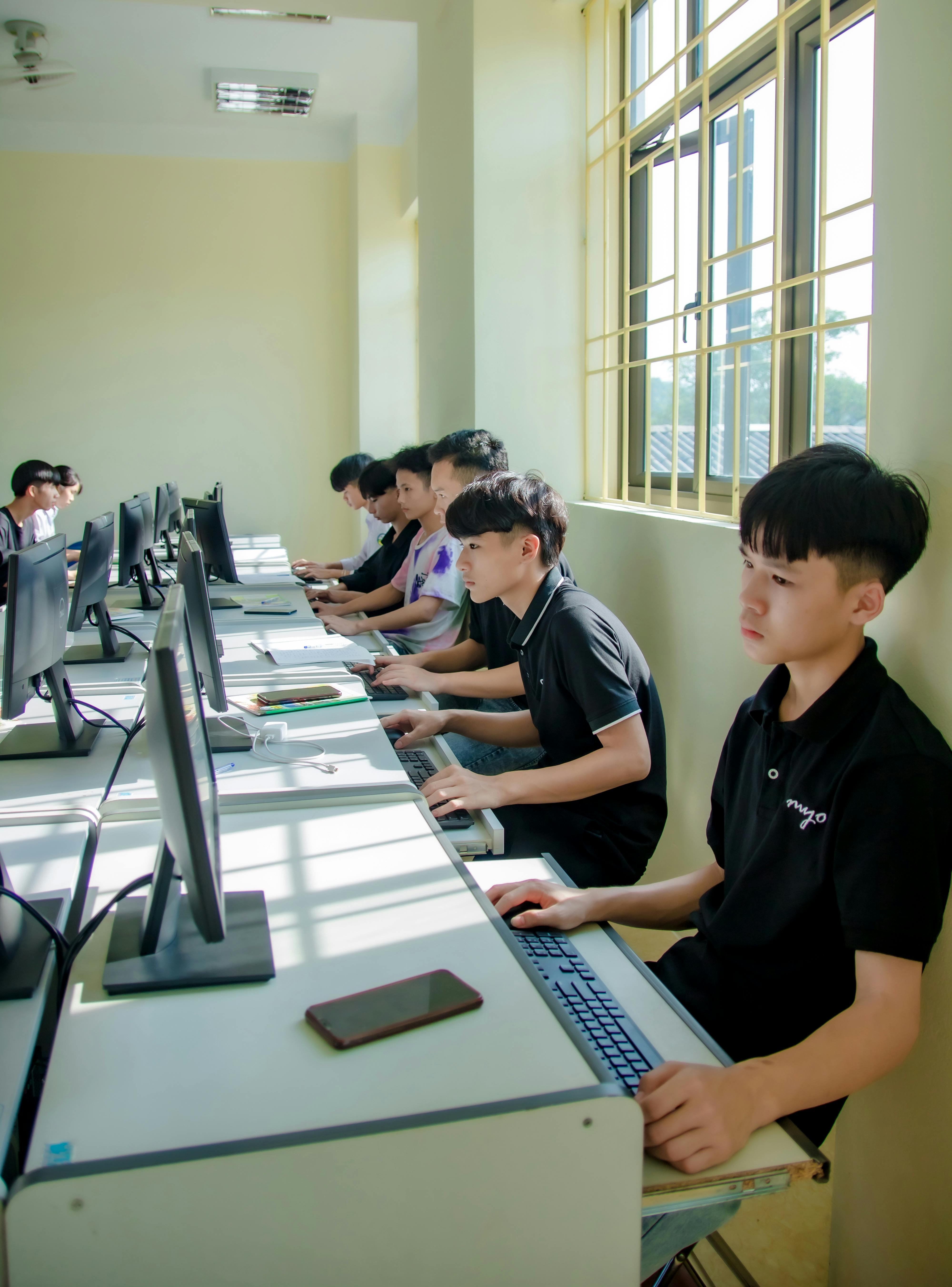 Students Using Computers in a Classroom · Free Stock Photo