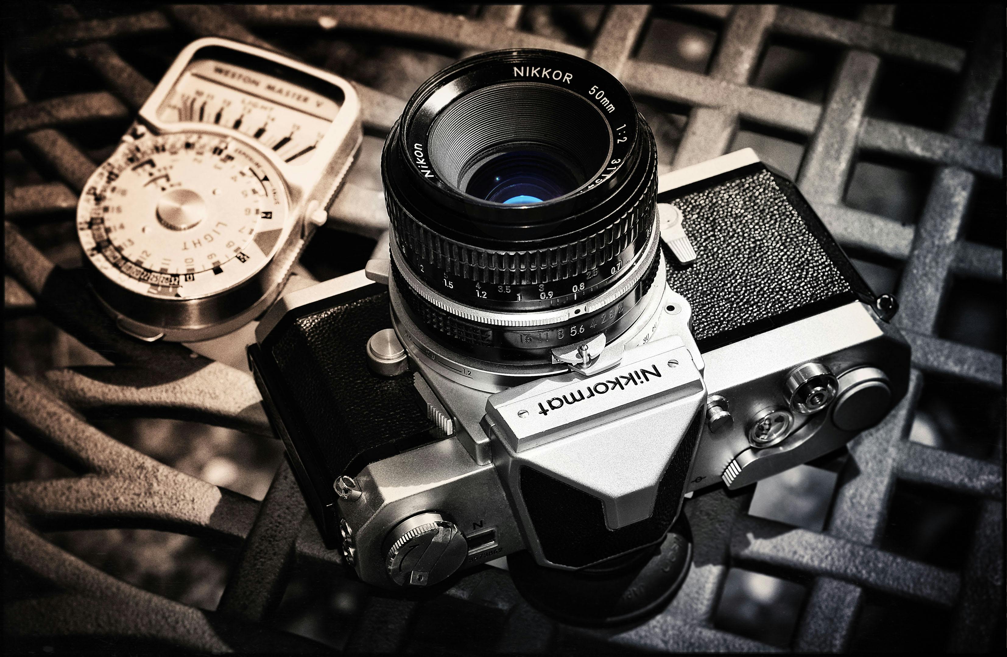 Black and Gray Nikkormat Mirrorless Camera · Free Stock Photo