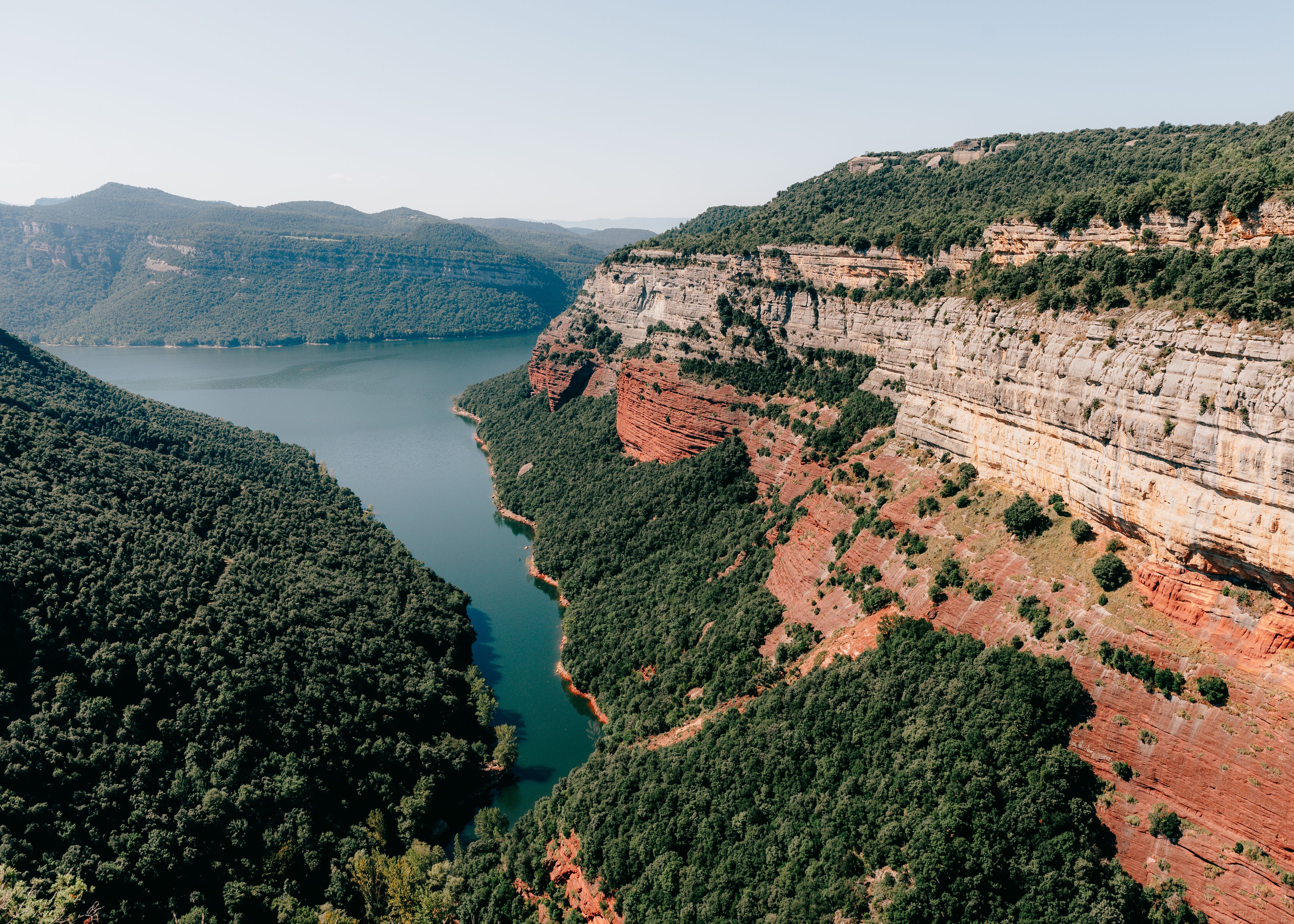 Sandstone Mountain Beside River · Free Stock Photo