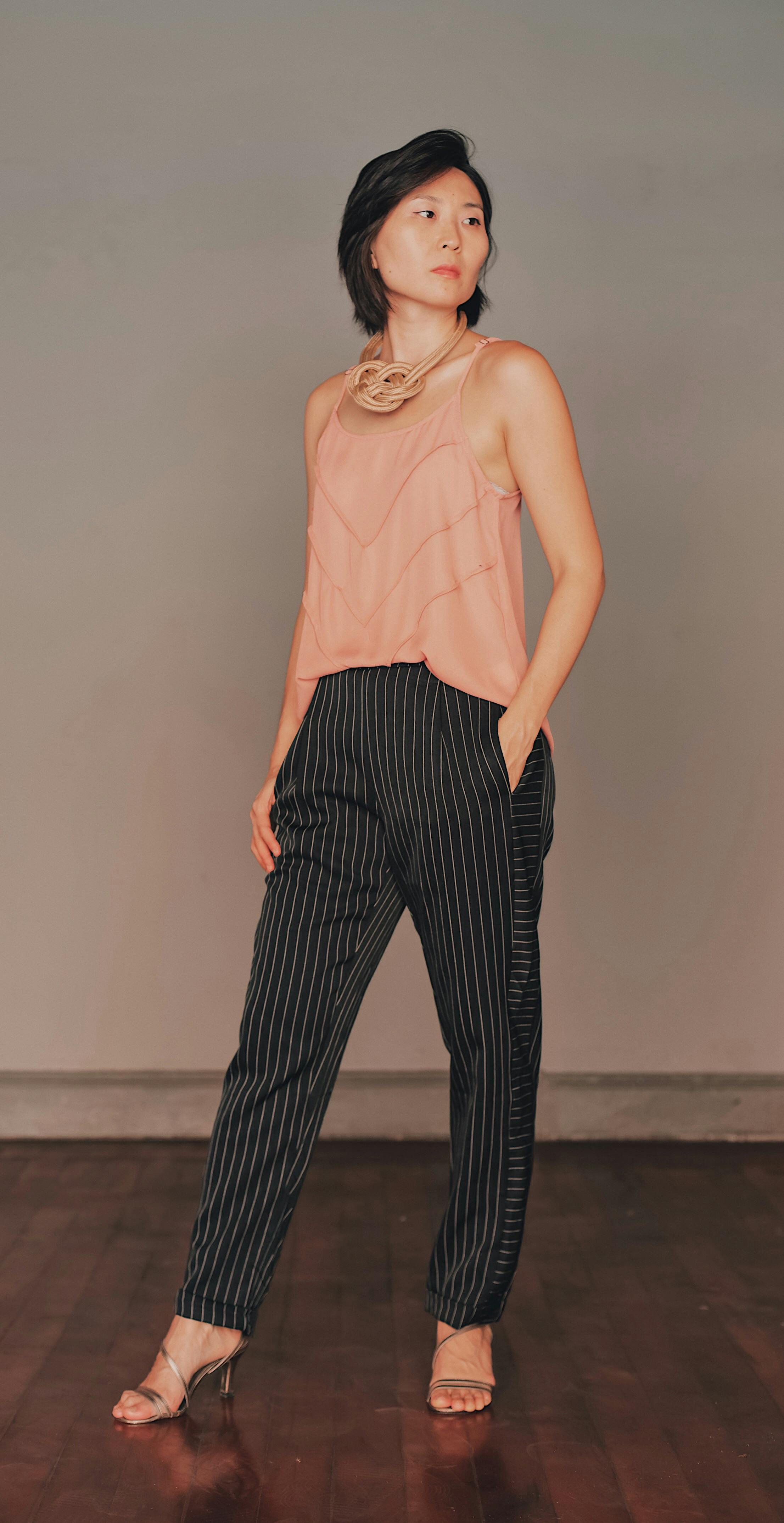 Woman in Printer Crop Top Posing · Free Stock Photo