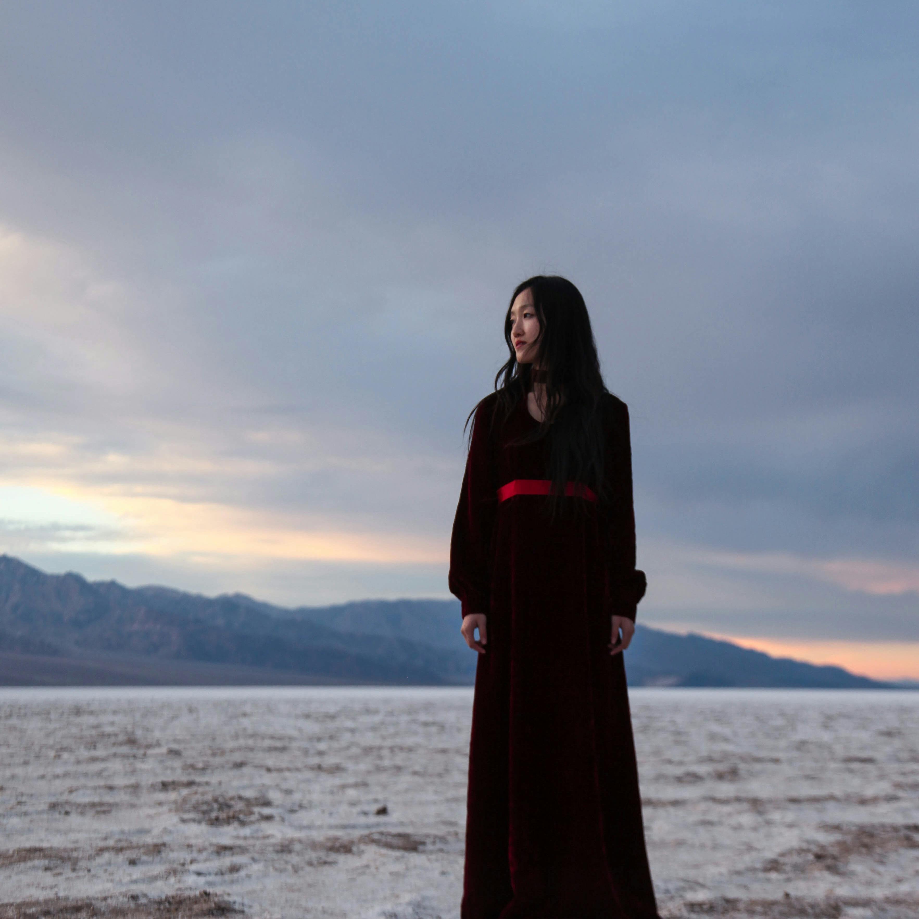 Woman in Maroon Dress in the Desert · Free Stock Photo