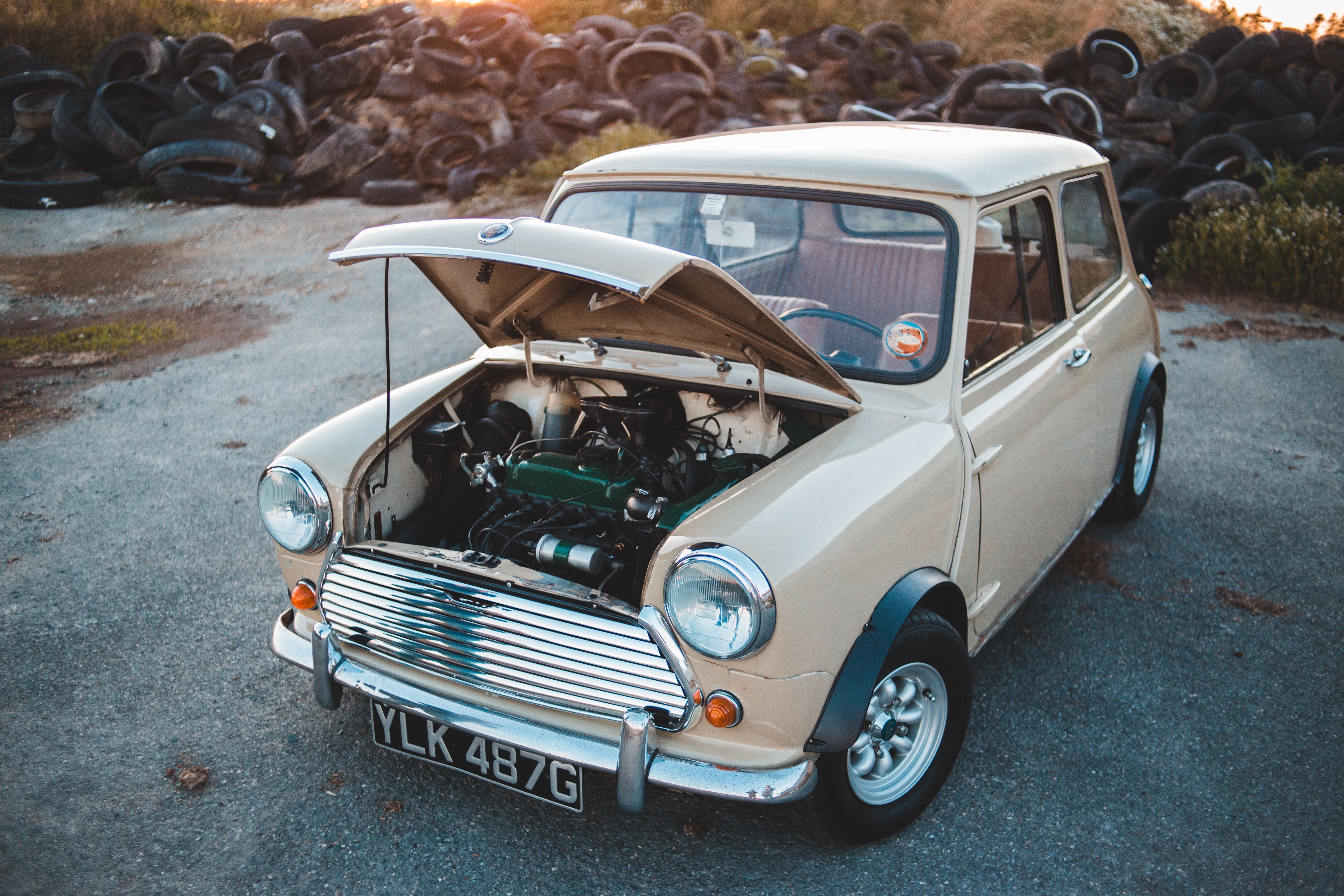 Old fashioned car with open hood · Free Stock Photo