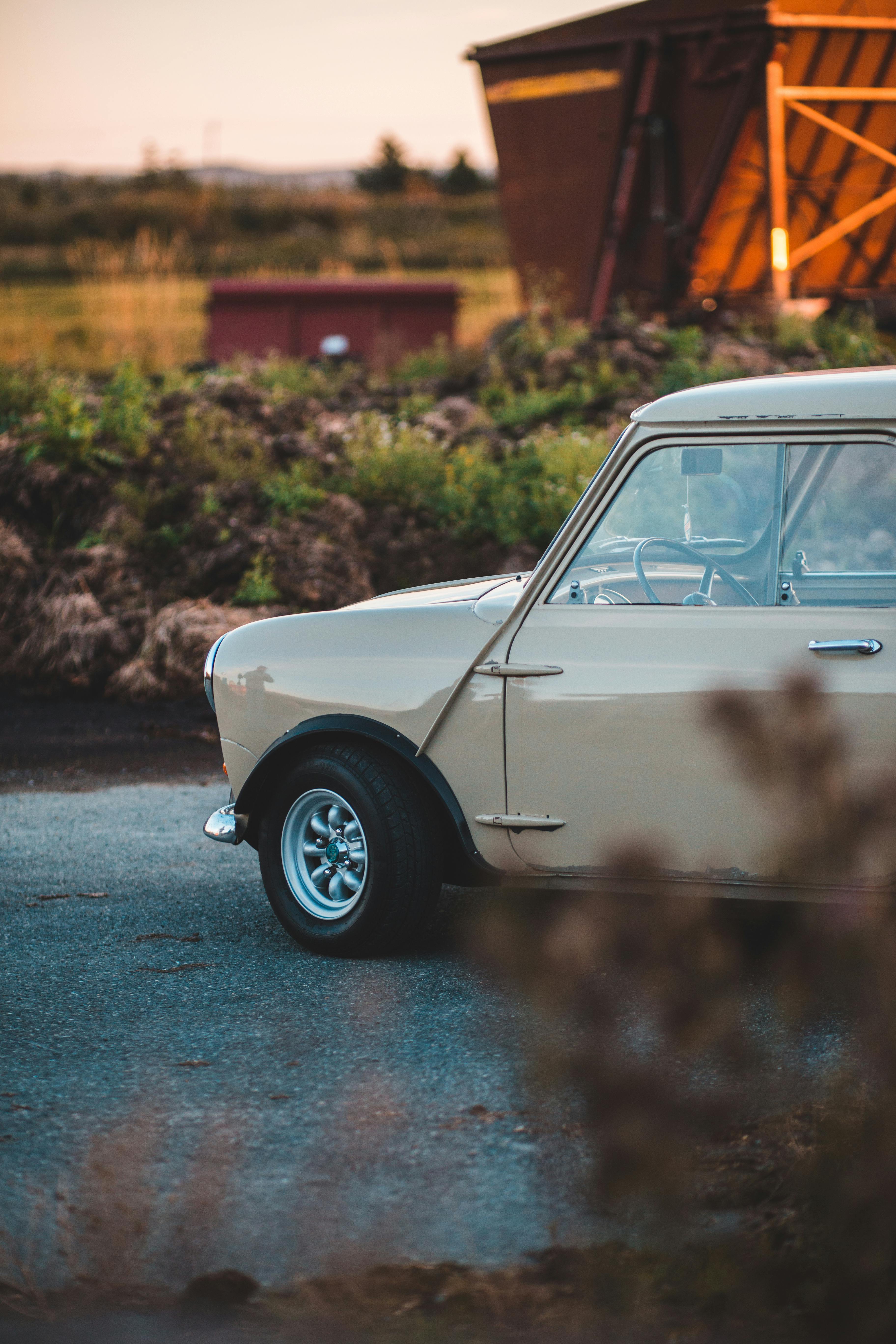Light vintage car in countryside · Free Stock Photo