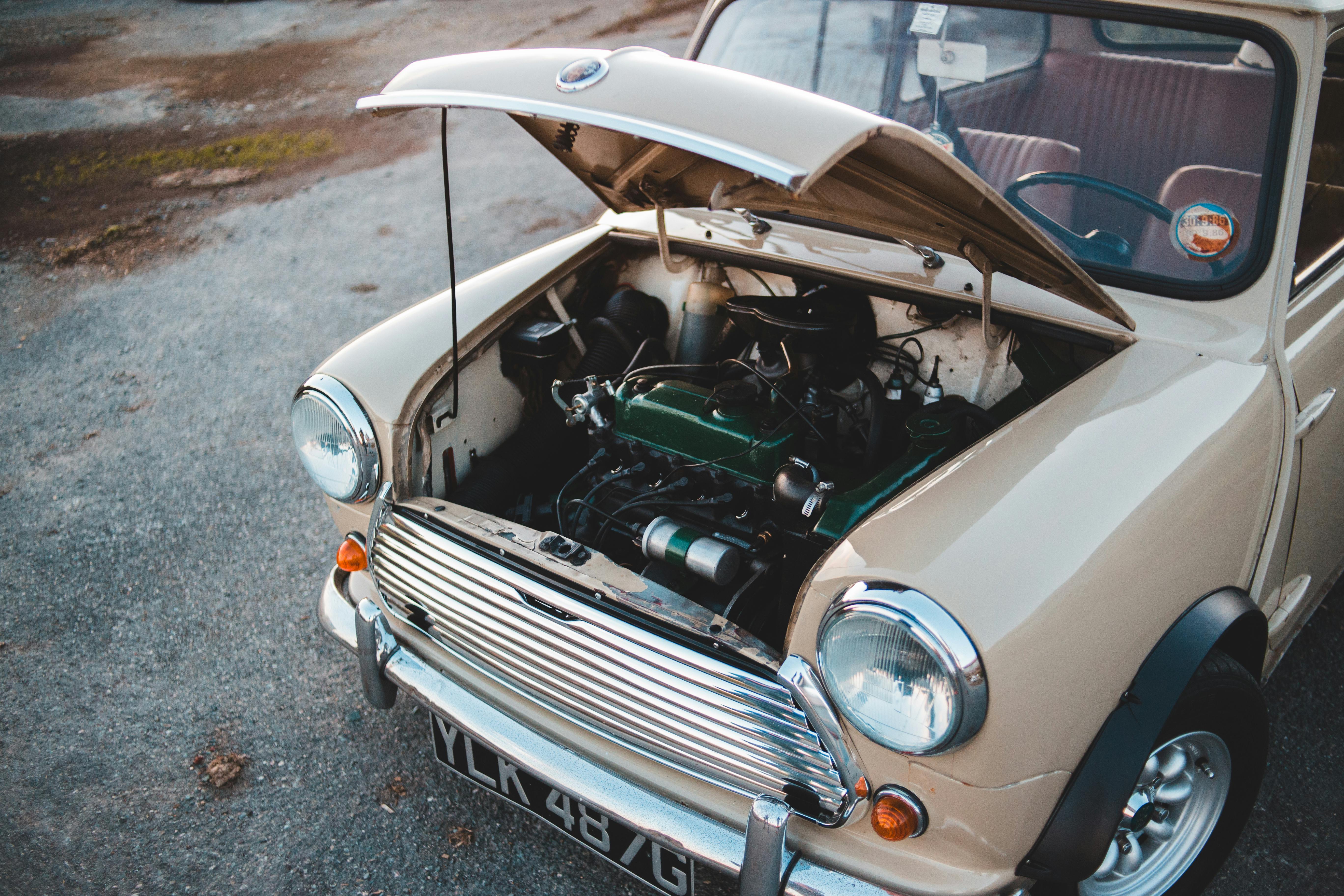 Vintage car with open hood · Free Stock Photo