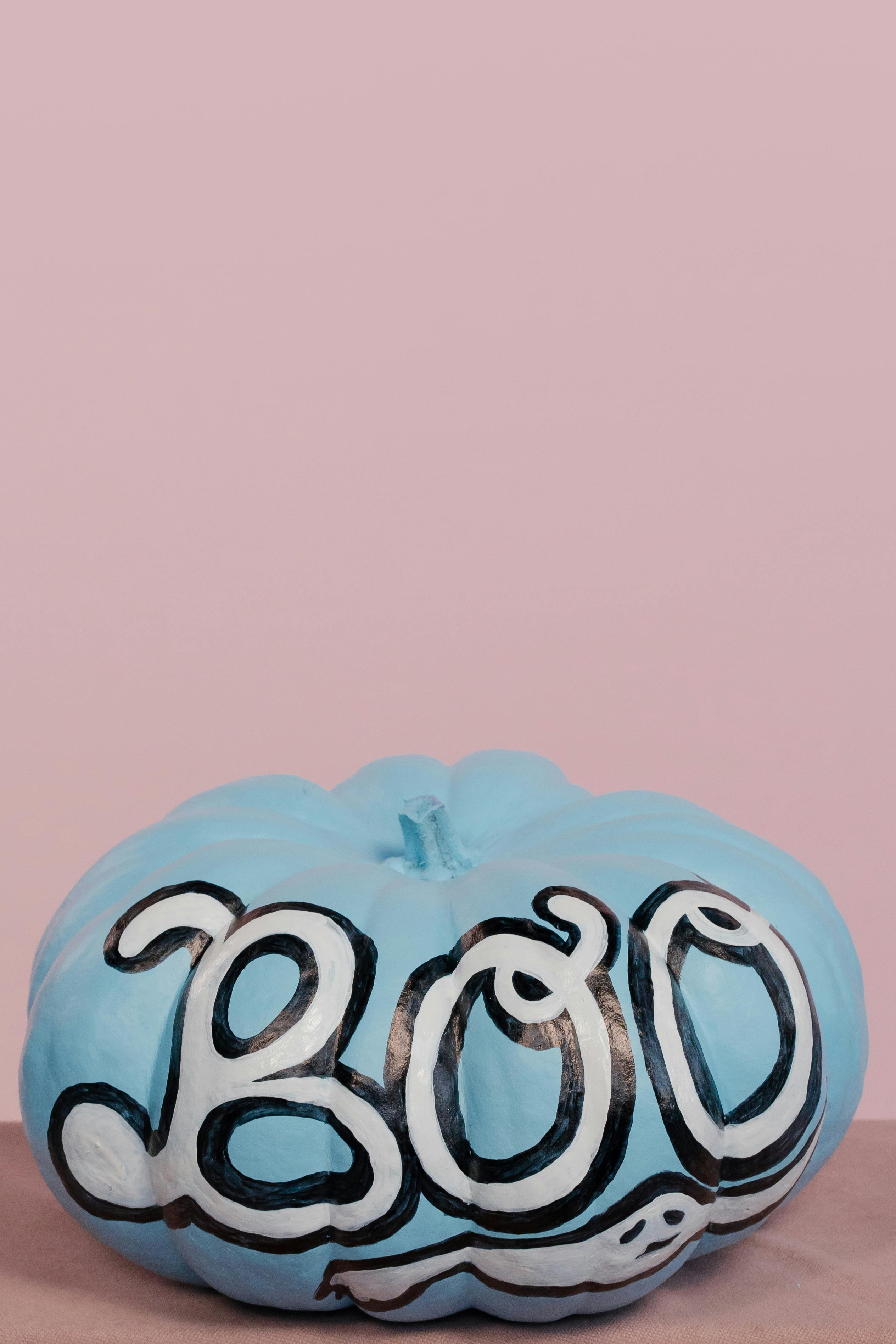 A White Boo Signage on White Background · Free Stock Photo