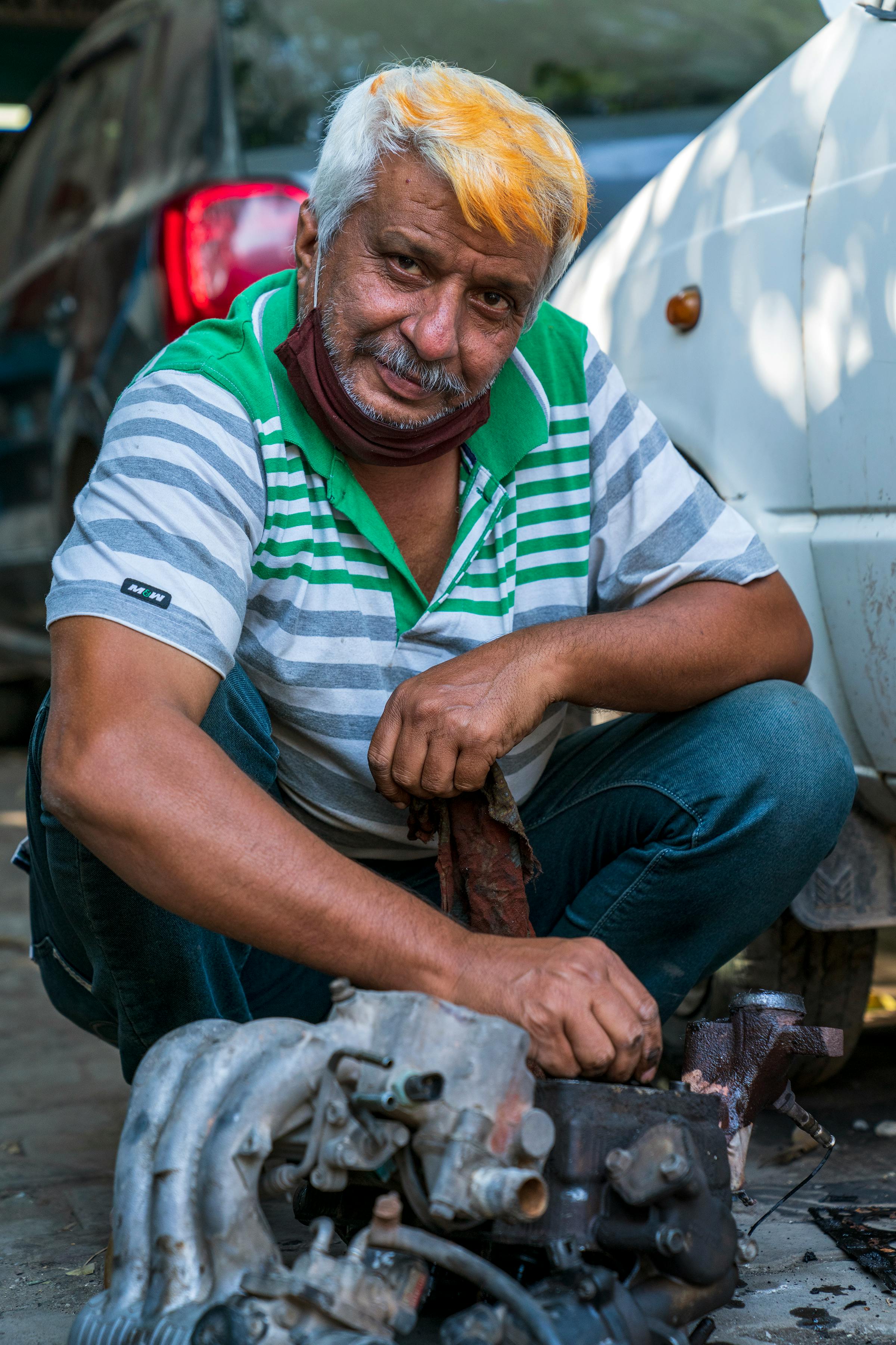 Close-Up Photo of an Auto Mechanic · Free Stock Photo