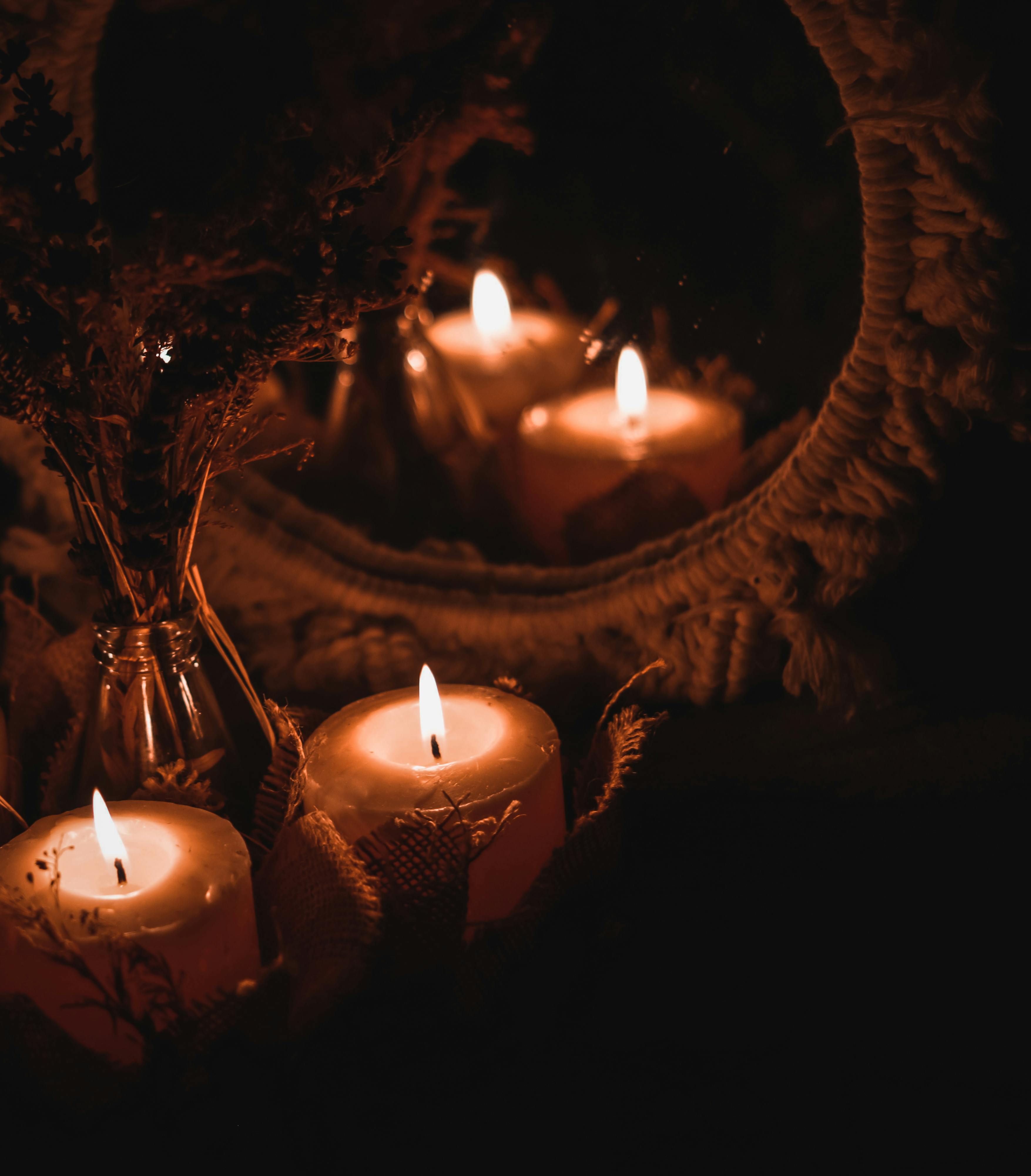 Lighted Candles in Front of a Mirror · Free Stock Photo