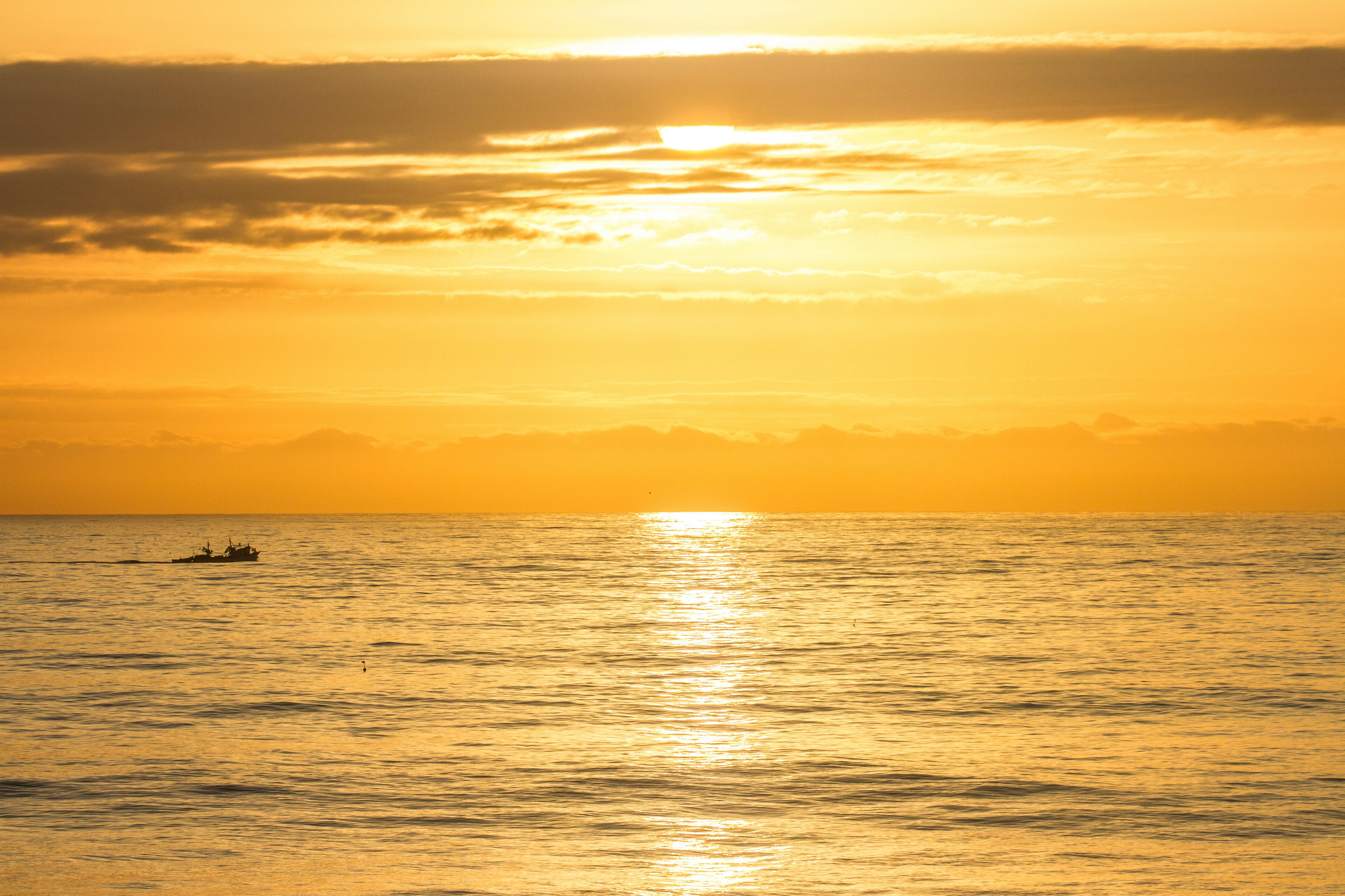 Body of Water during Sunset · Free Stock Photo