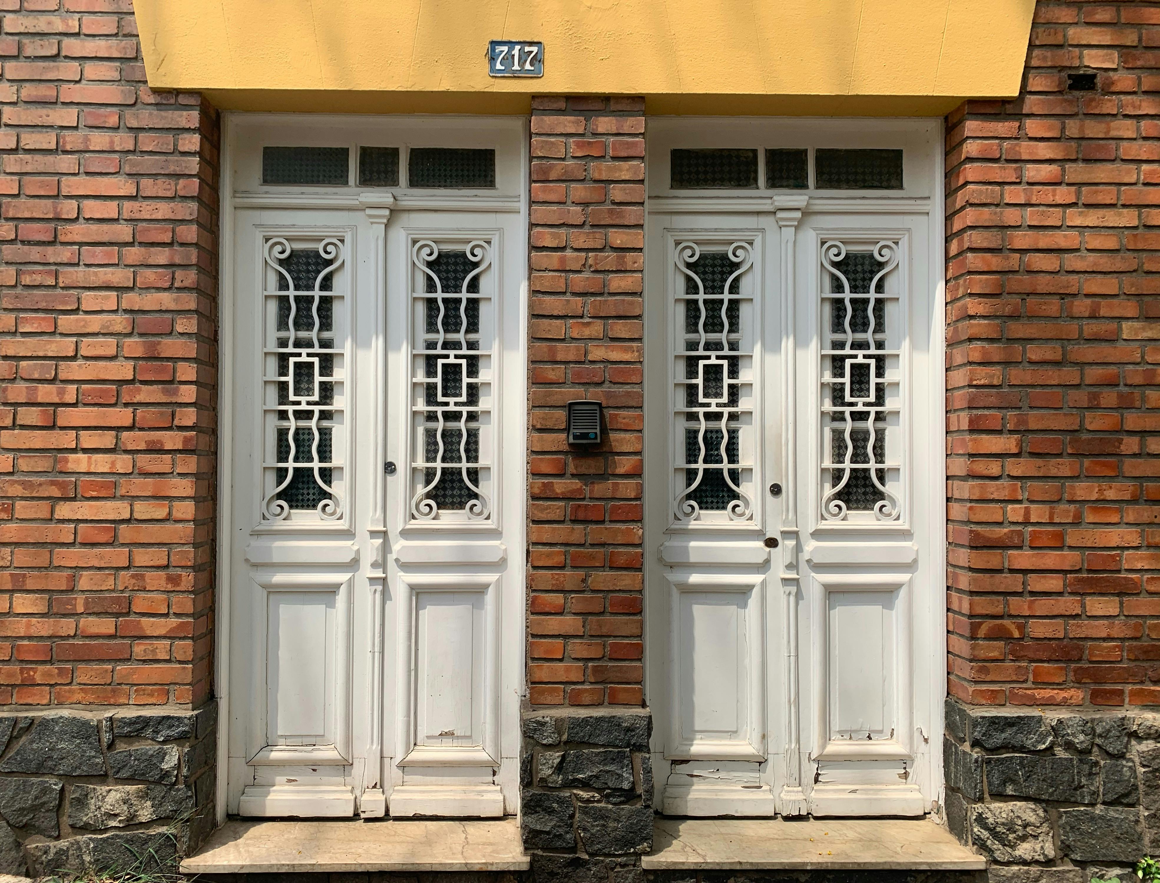 Brick Building with White Double Doors · Free Stock Photo