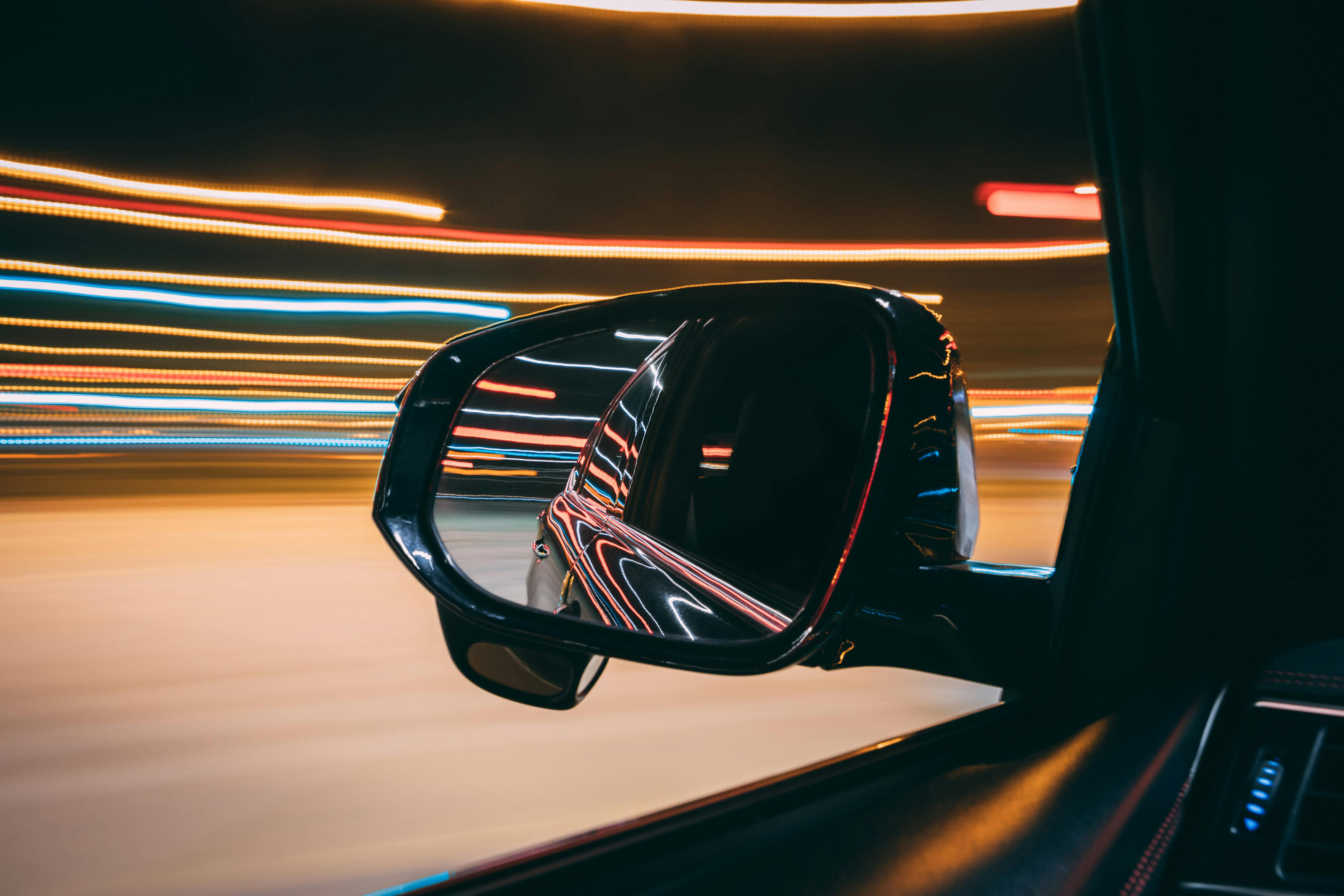 Black Car Side Mirror Showing Car at Night · Free Stock Photo