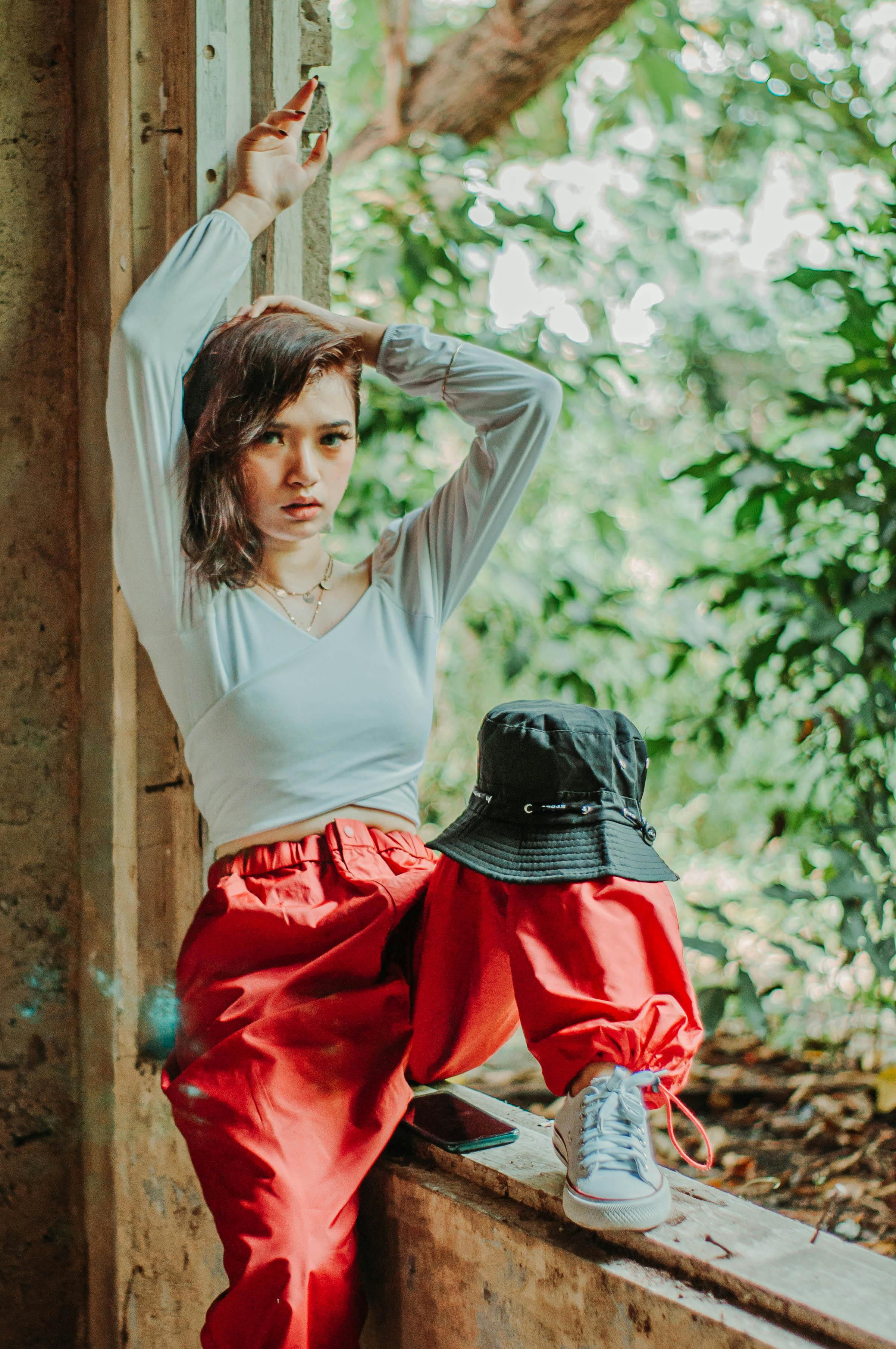 Calm woman with small lamp at night · Free Stock Photo