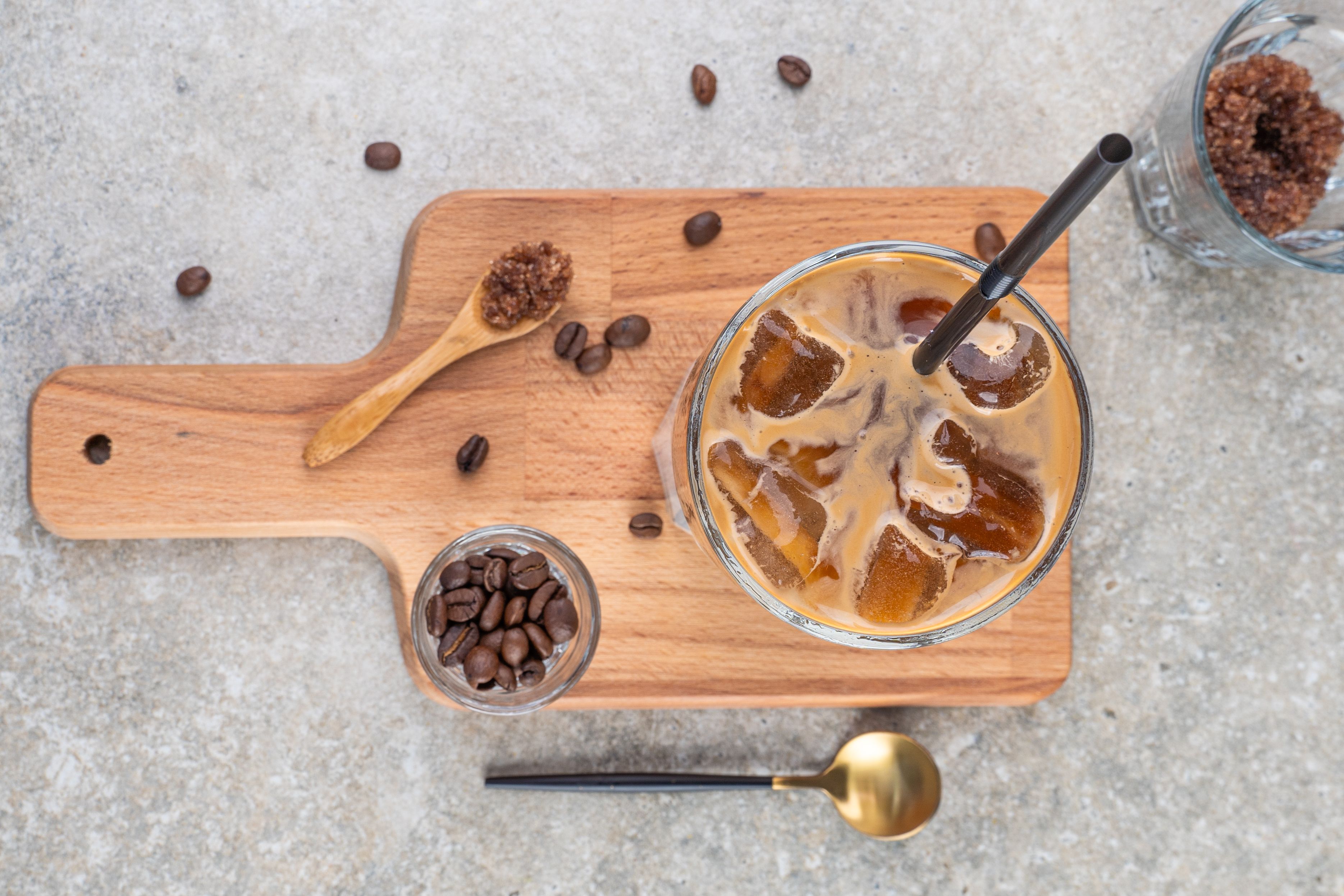 High Angle Shot of an Iced Coffee with Straw · Free Stock Photo