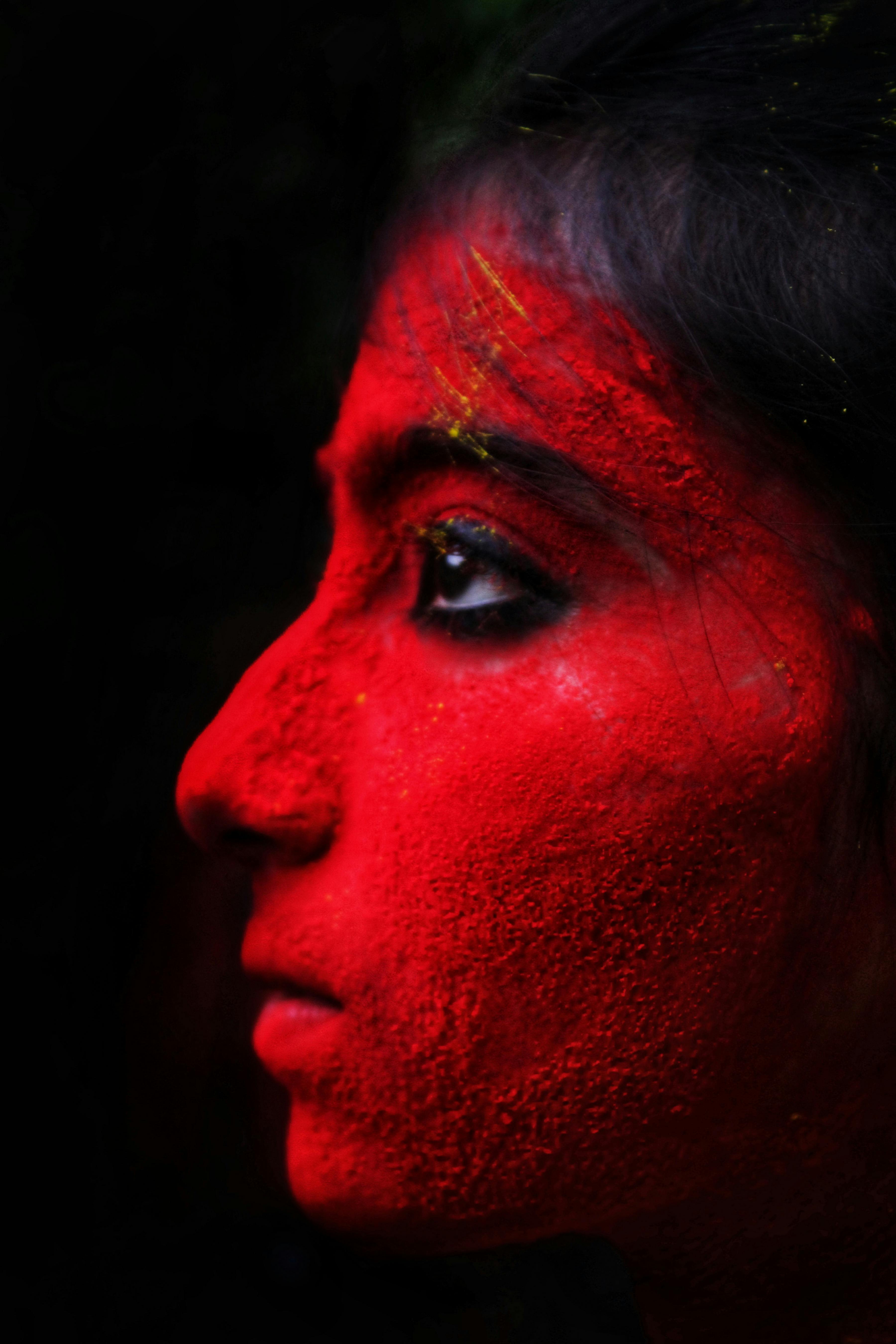 A Face Covered with Red Powder · Free Stock Photo
