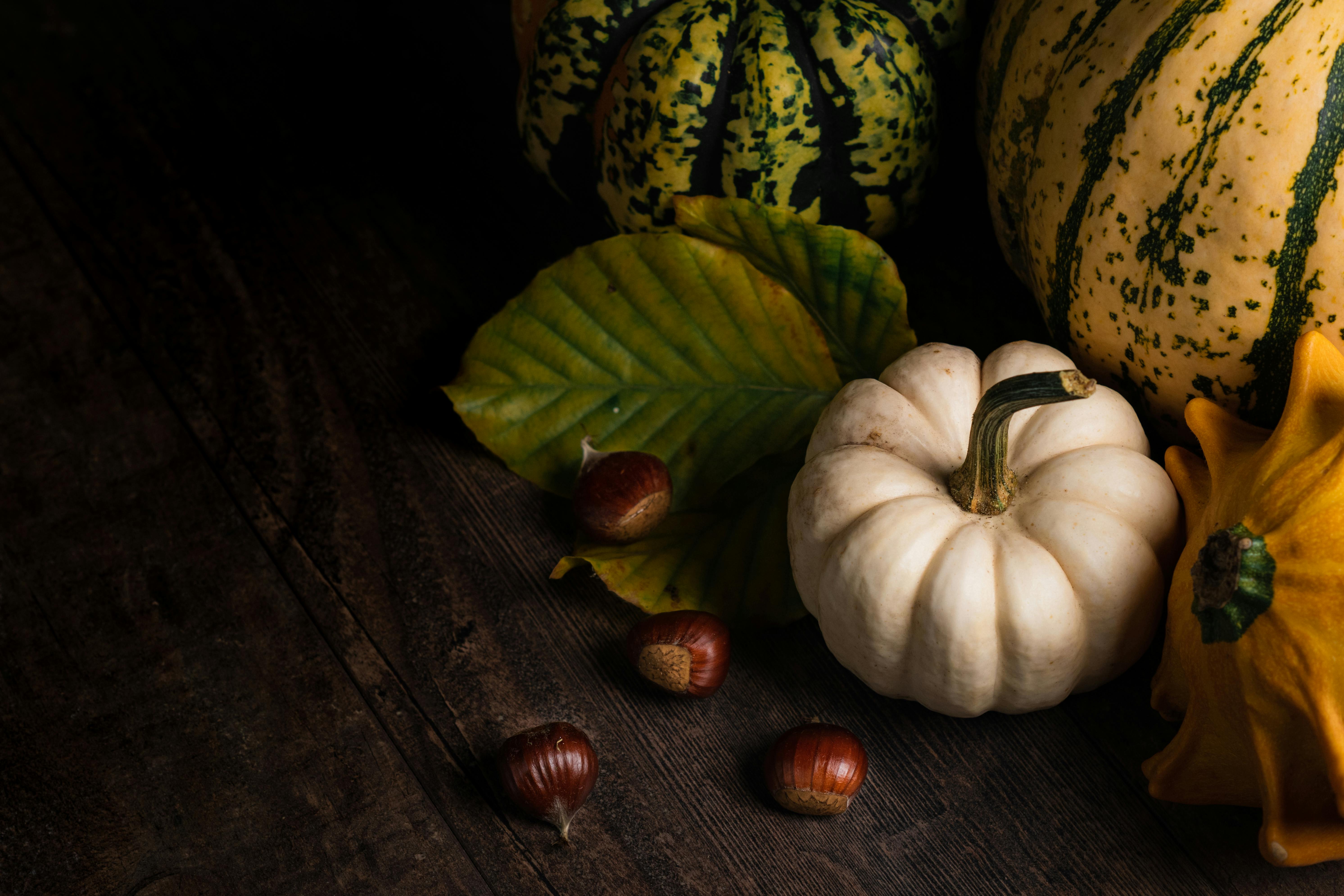 Pumpkins on Wooden Surface · Free Stock Photo
