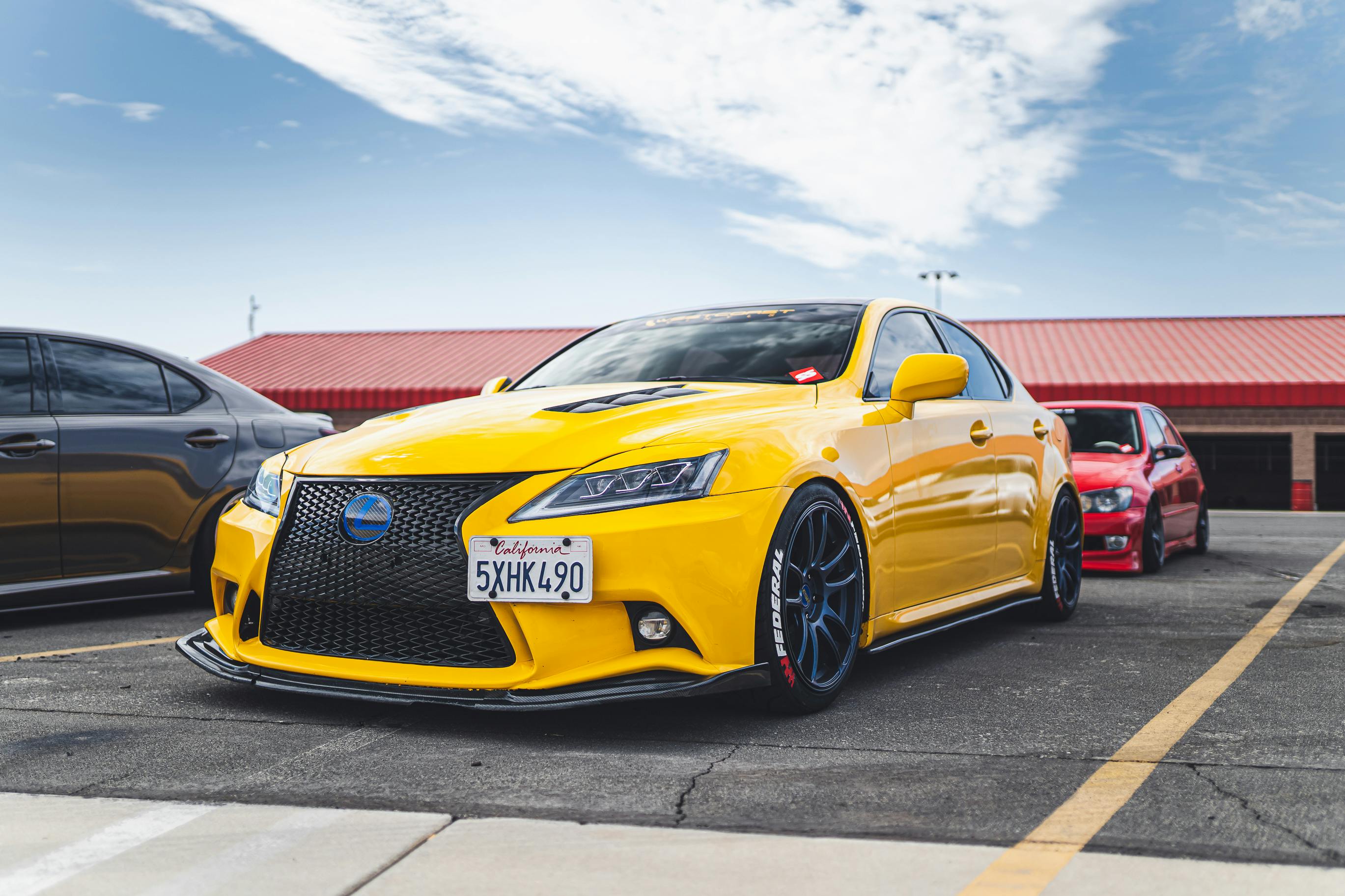 Yellow Lexus parked on a Pavement · Free Stock Photo
