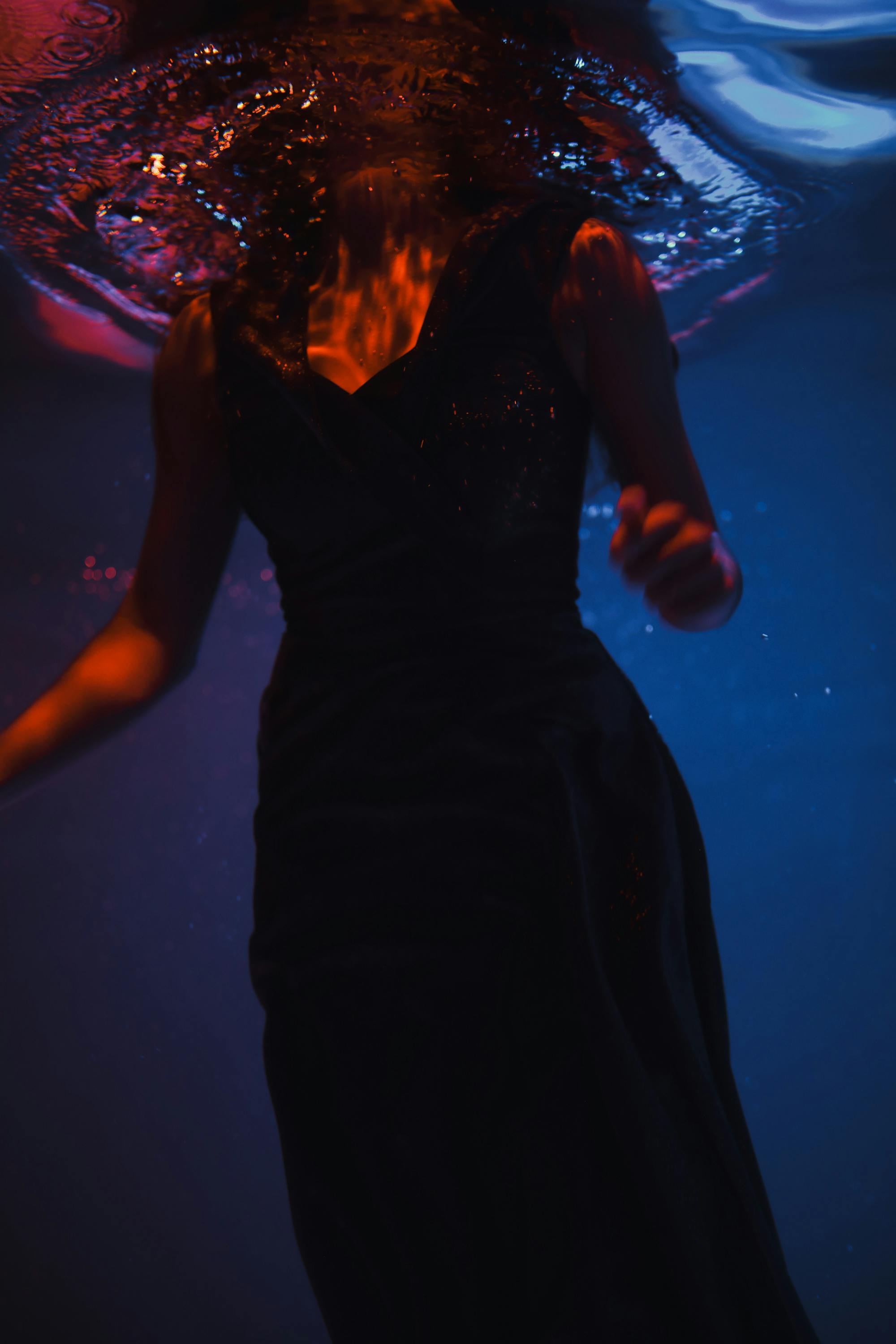 Woman's Body Submerged Underwater · Free Stock Photo