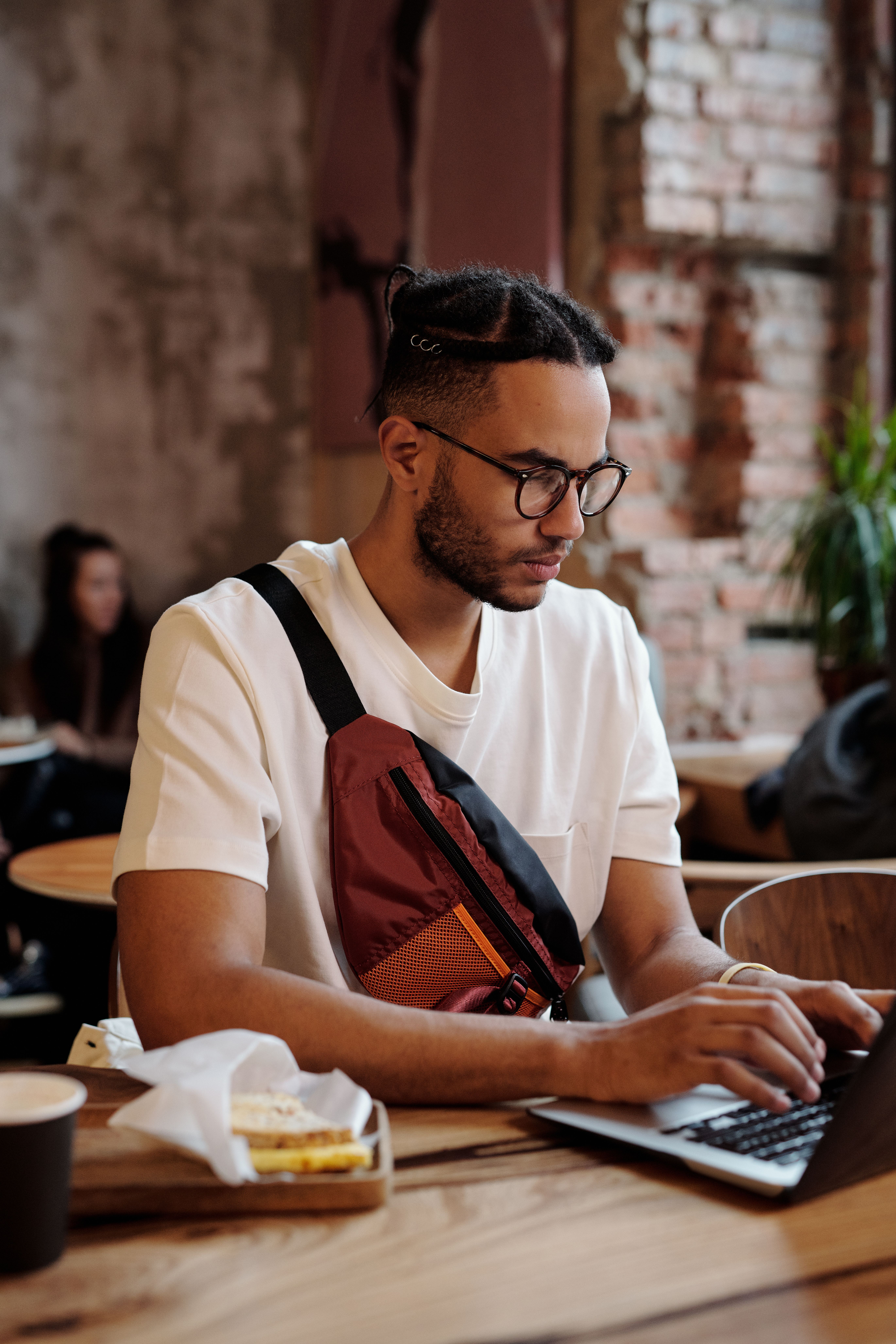 A Man Working at a Coffee Shop · Free Stock Photo