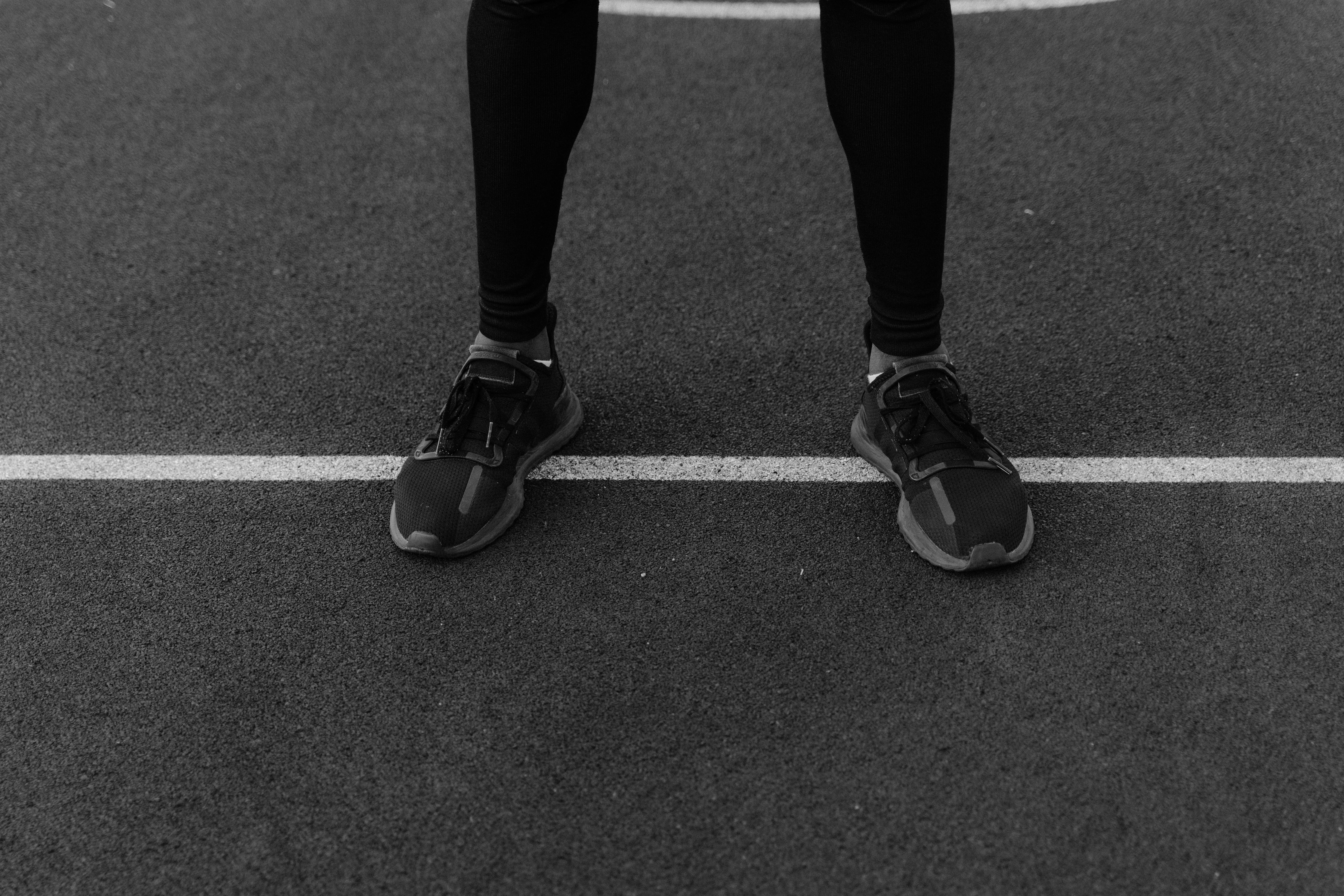 A Person Stepping on a Line · Free Stock Photo