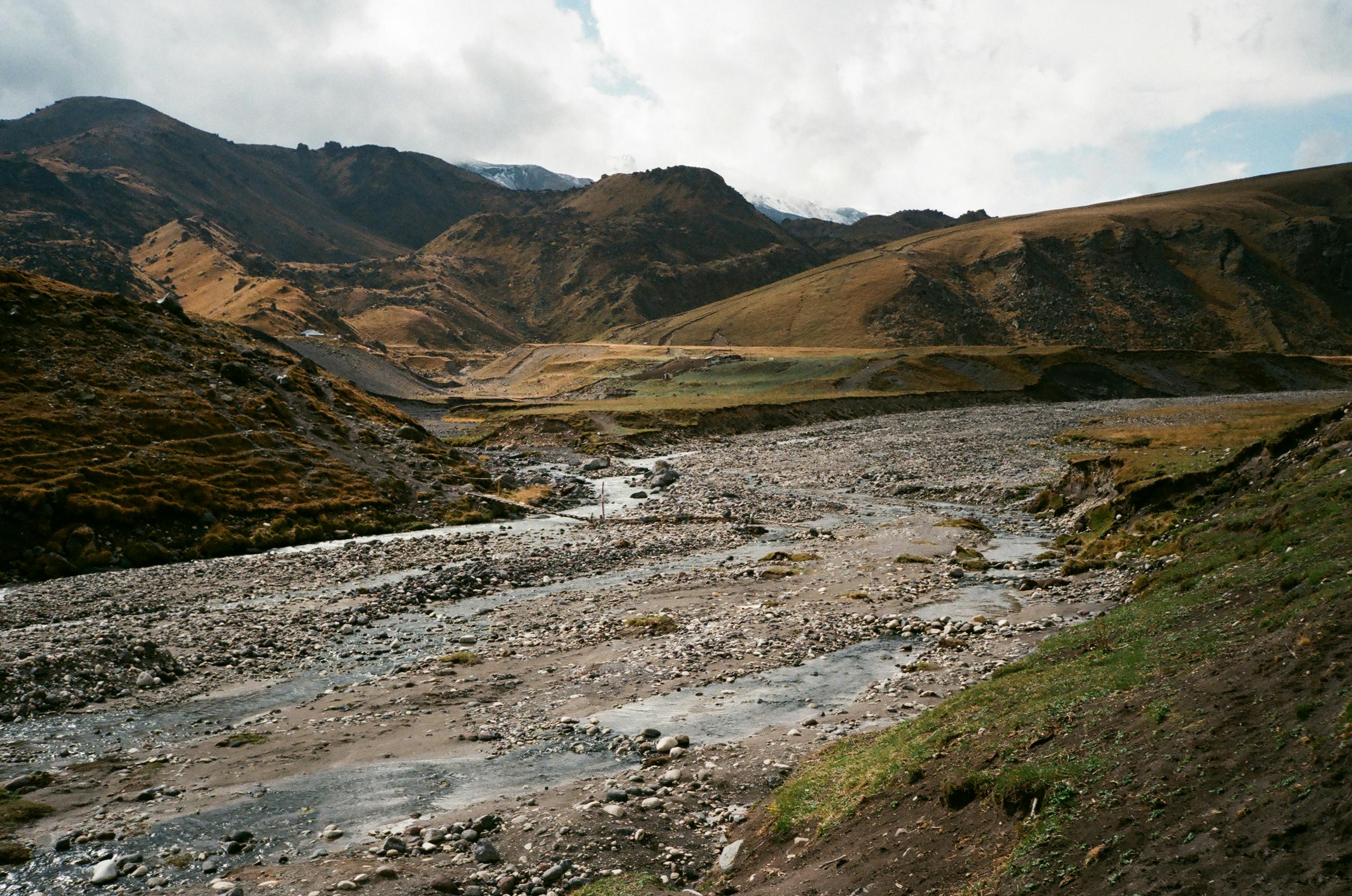 Stone riverbed of river in rocky canyon at daytime · Free Stock Photo