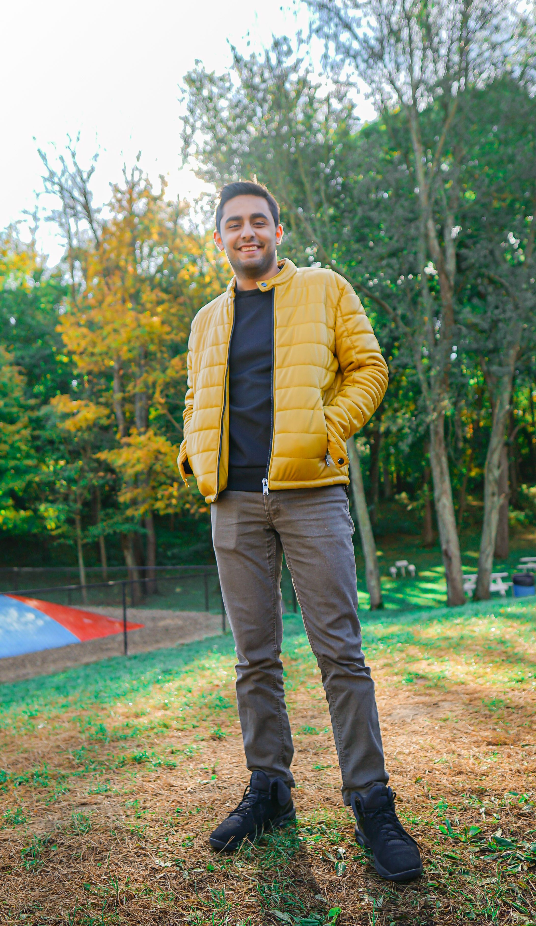 Man in Satin Yellow Jacket Standing in Fashion Studio · Free Stock Photo