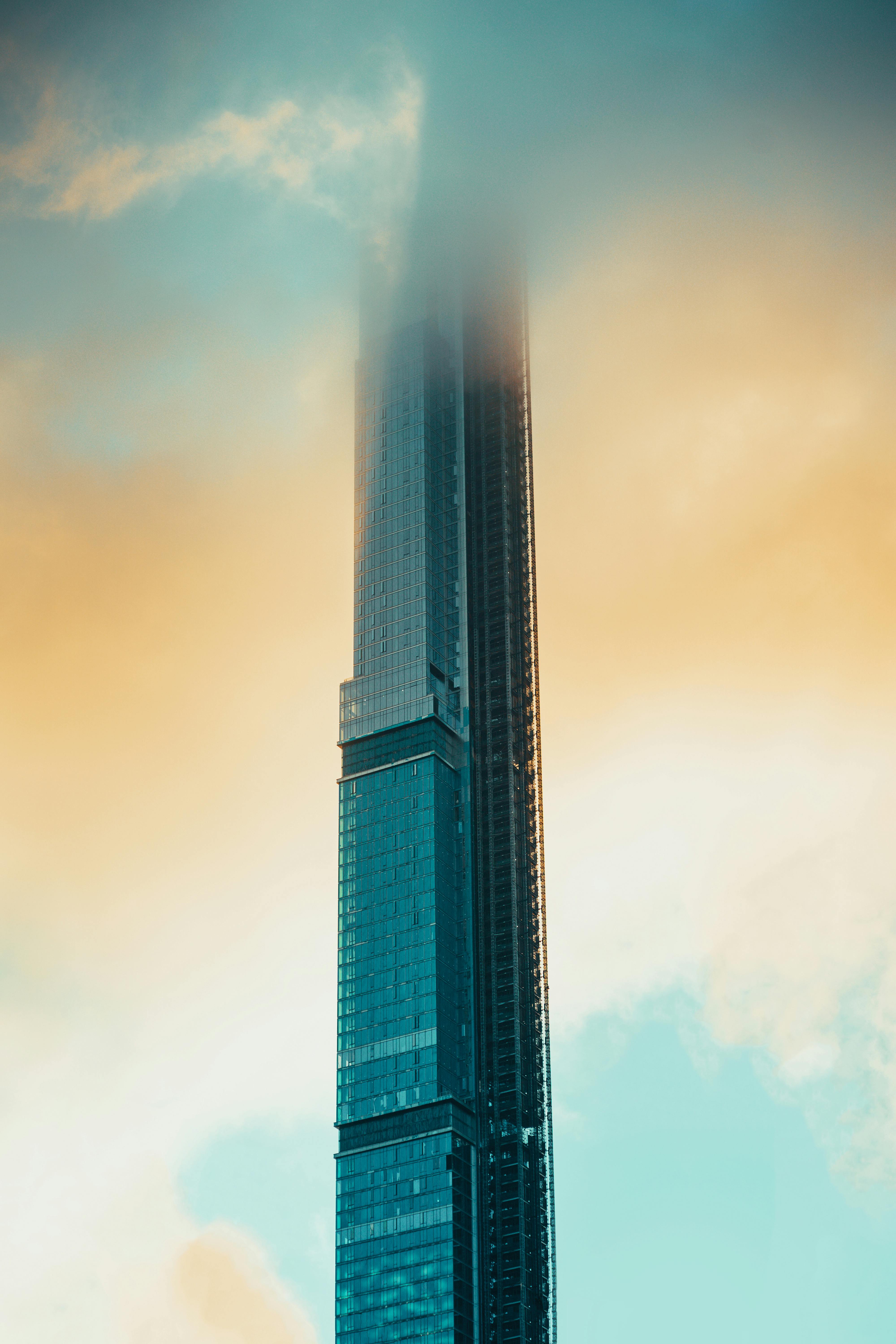 High Rise Building Touching the Clouds · Free Stock Photo