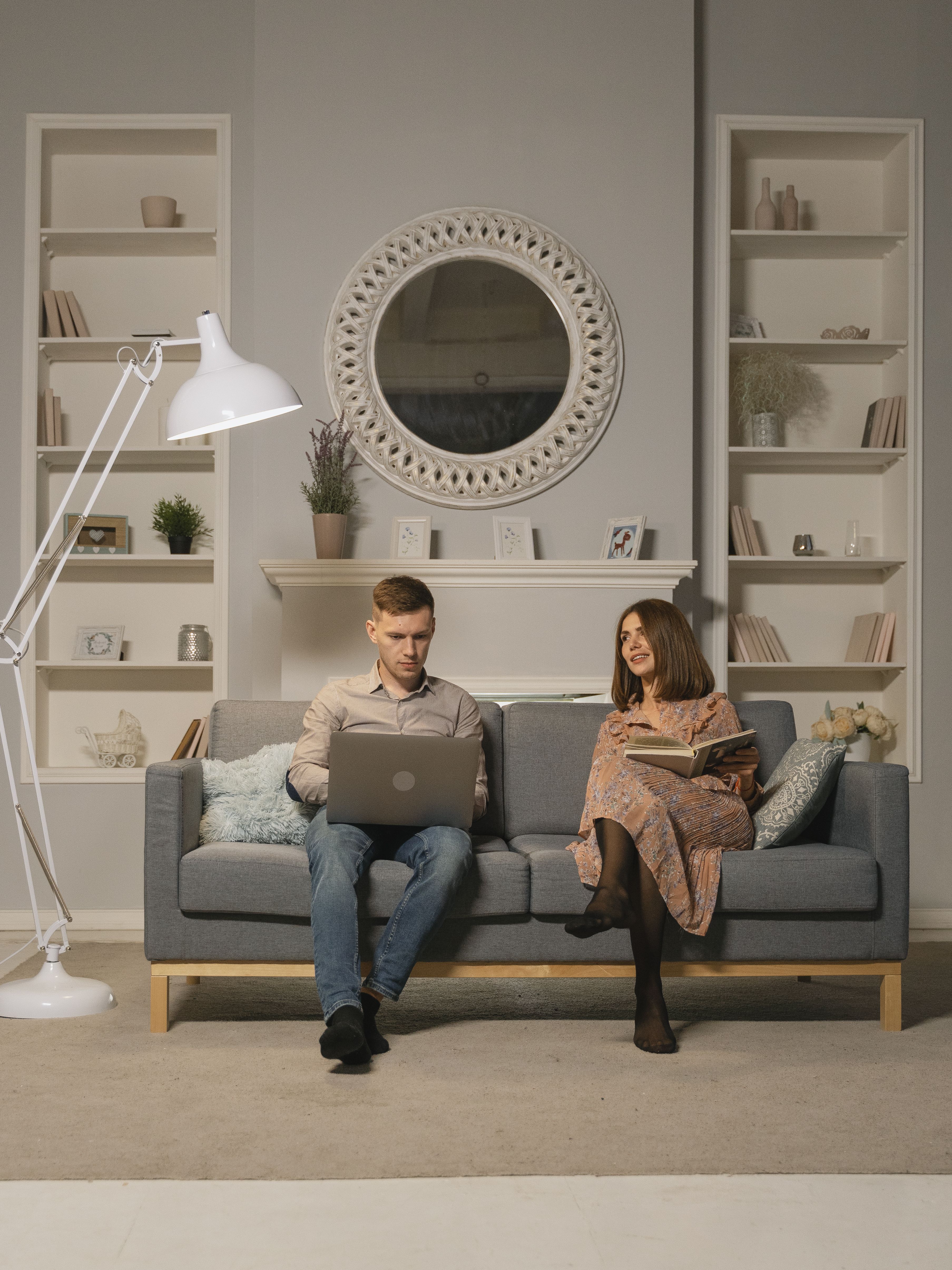 Two People Sitting on a Sofa · Free Stock Photo