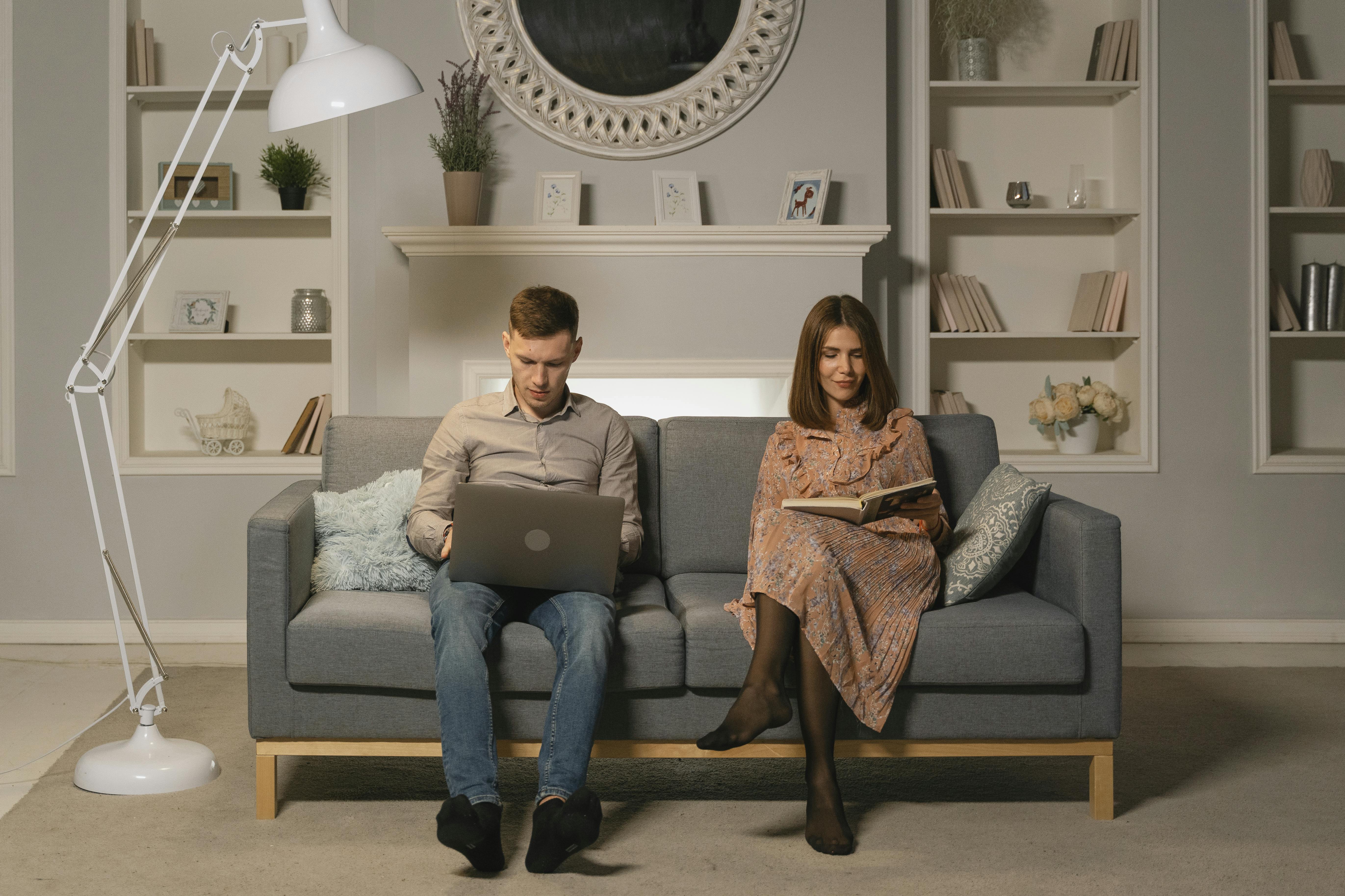 Two People Sitting in a Living Room · Free Stock Photo