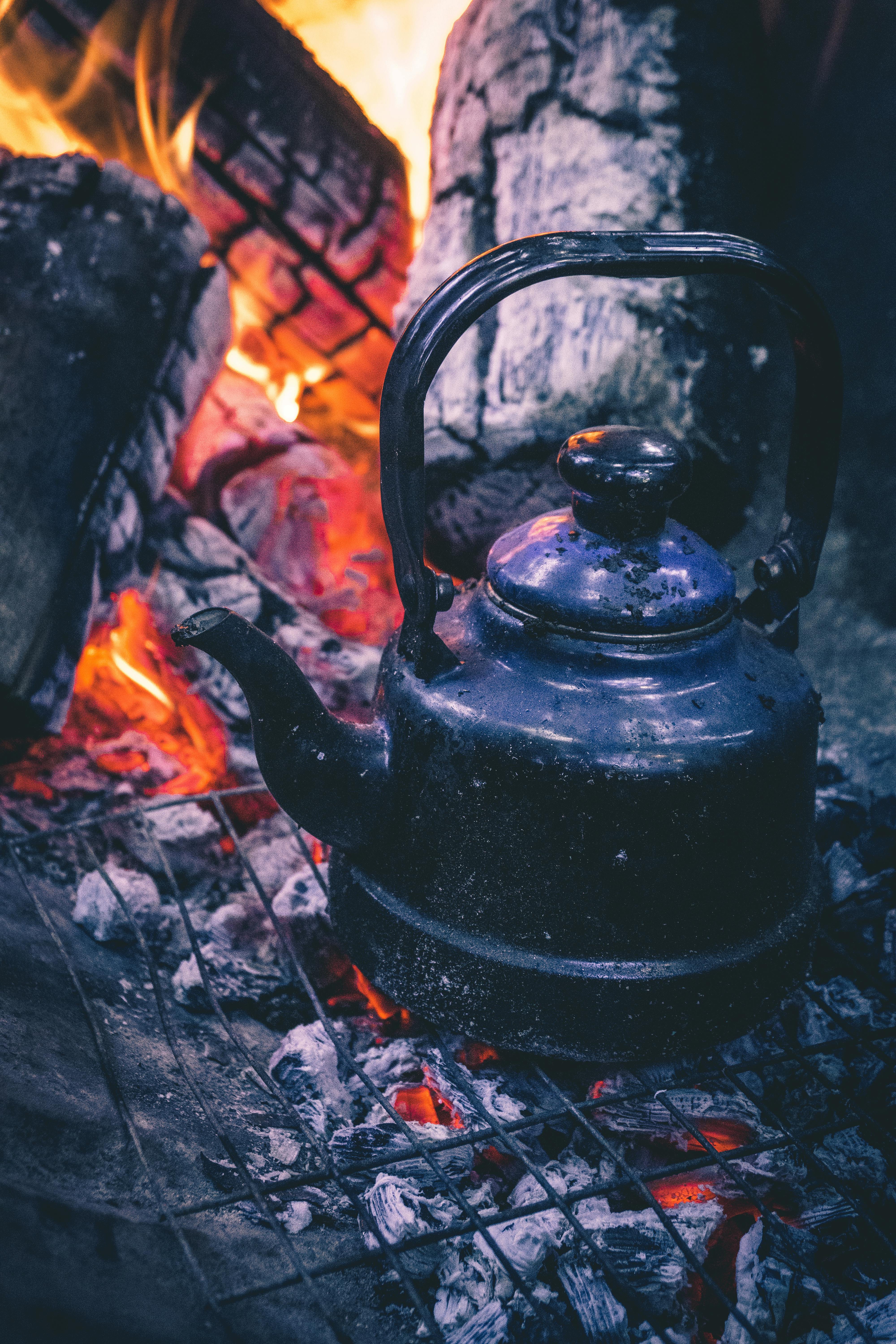 Kettle on hot burning fire · Free Stock Photo