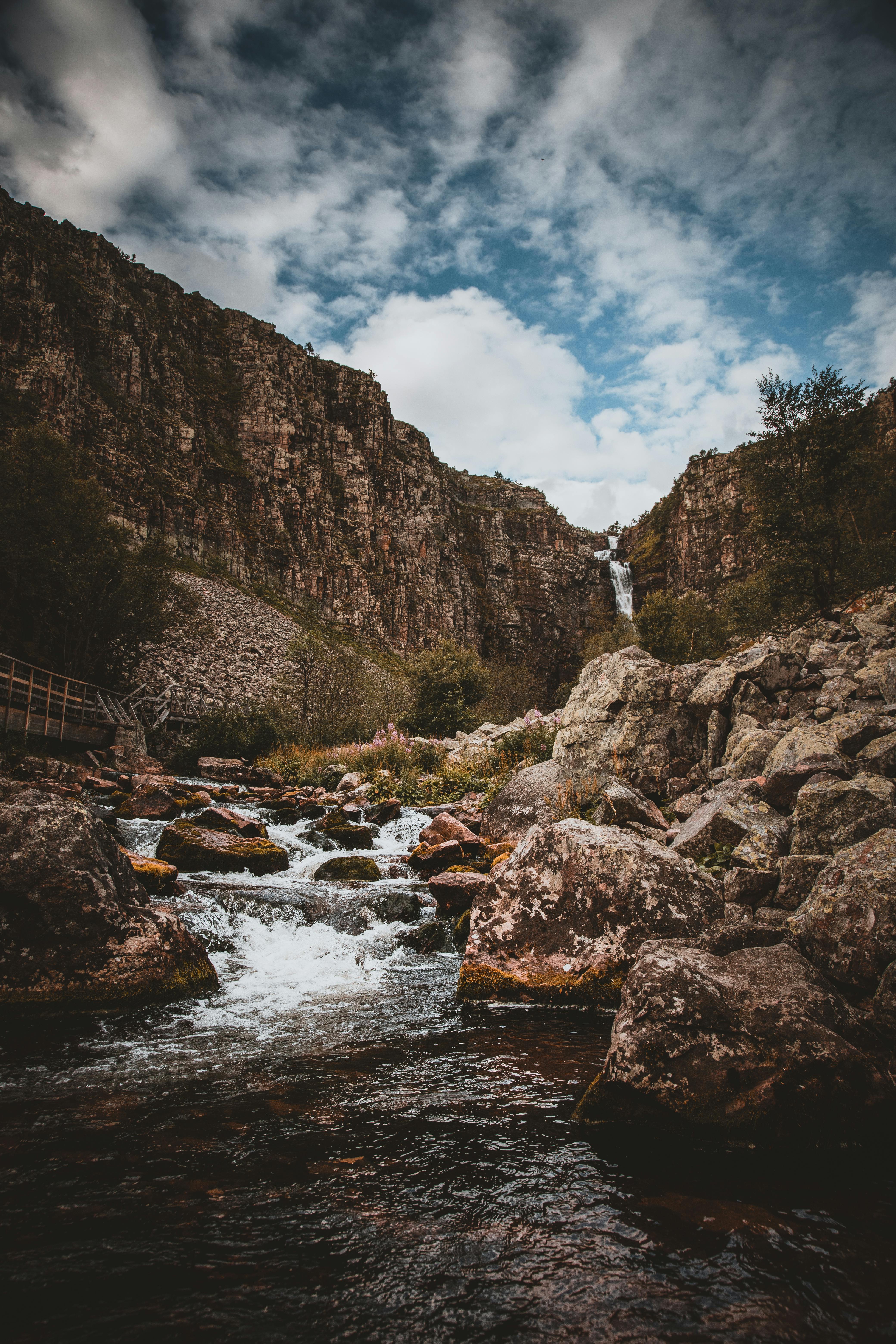 Photo of Waterfall Under Dark Sky · Free Stock Photo