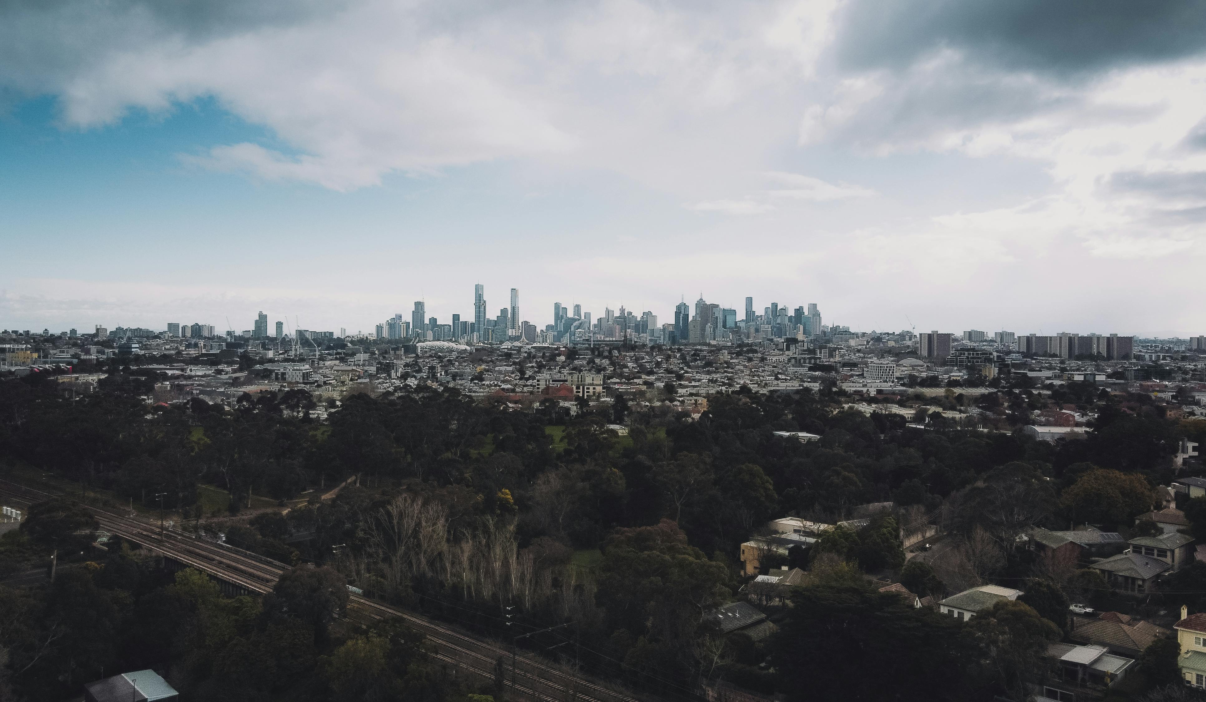 Cityscape behind Windows · Free Stock Photo
