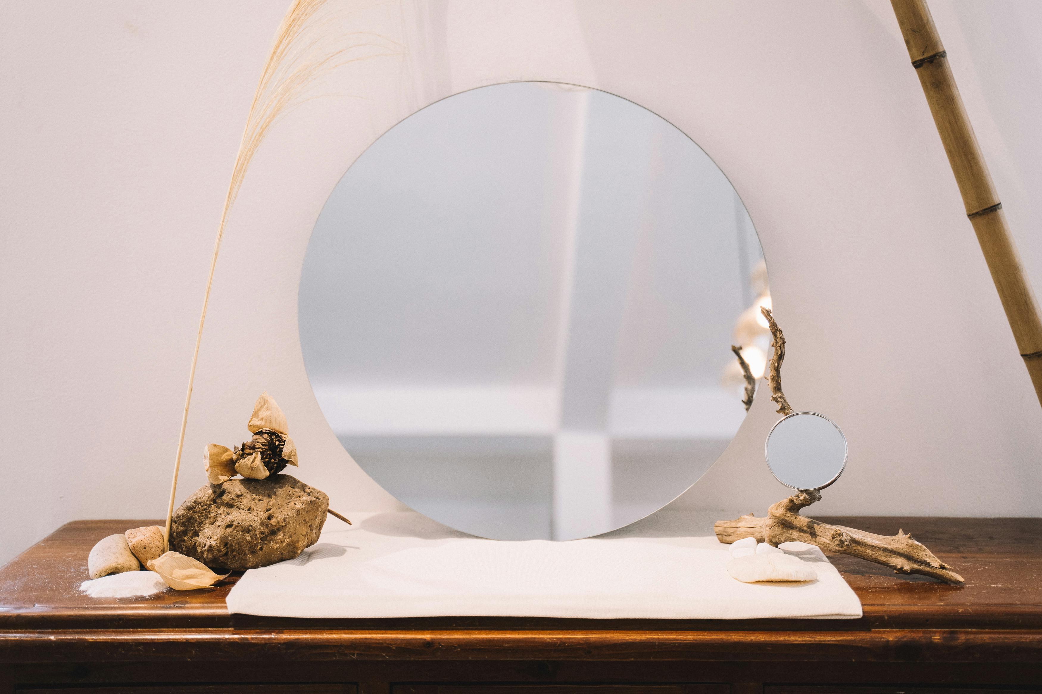 A Close-Up Shot of a Round Mirror · Free Stock Photo